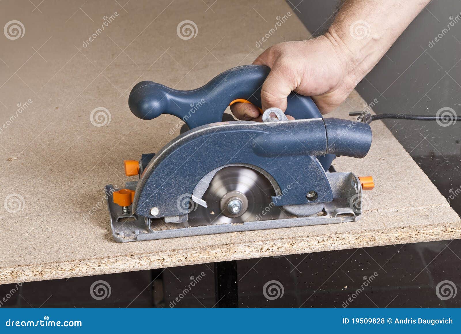 Carpenter with Circular Saw Stock Photo - Image of particle, filings ...