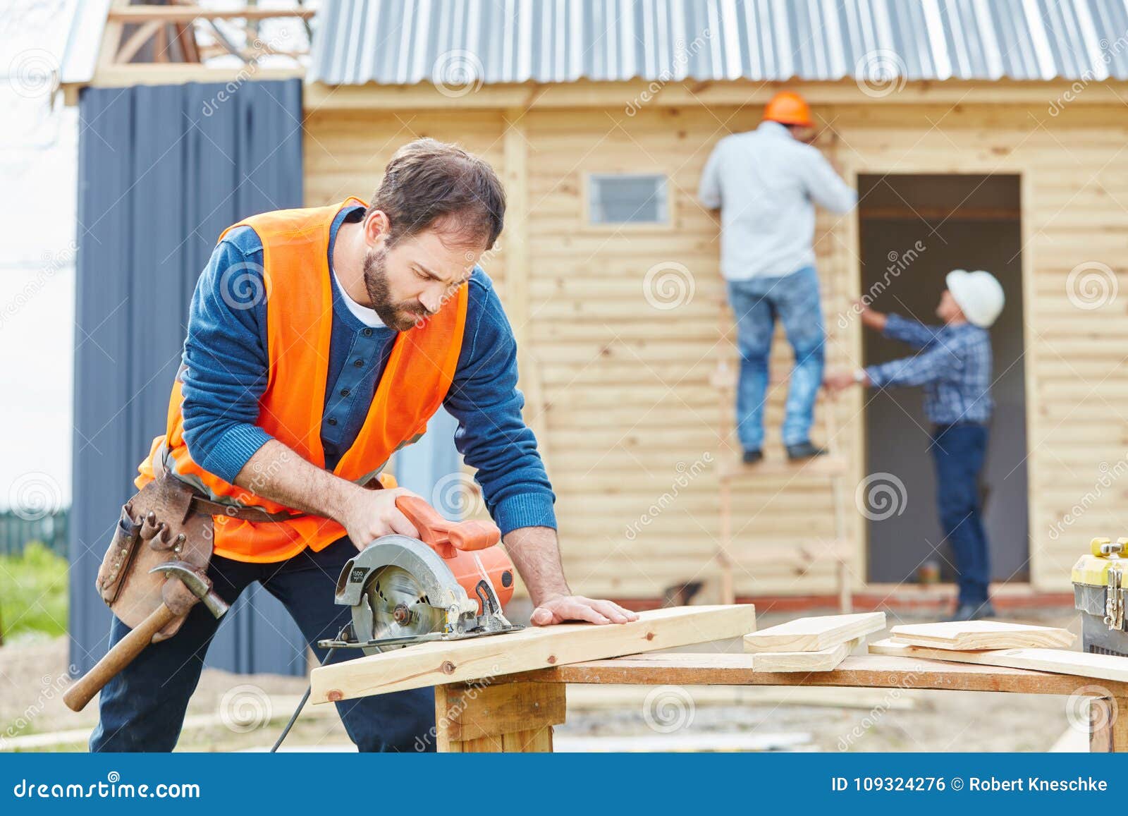 Carpenter at Construction Site Stock Photo - Image of circular ...
