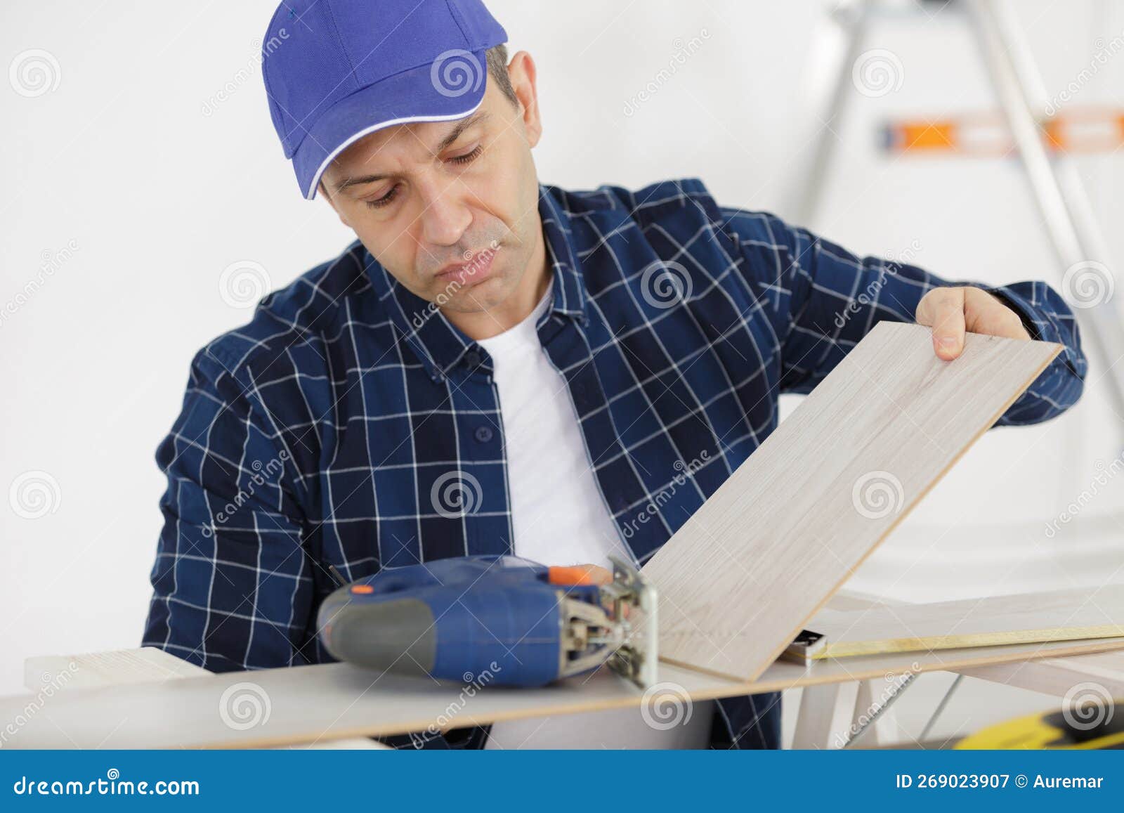 Carpenter after Cutting Plank Stock Image - Image of work, glove: 269023907