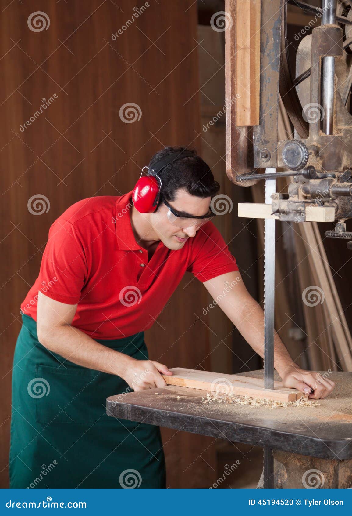 Carpenter Cutting Wood with Bandsaw Stock Photo - Image of machine ...