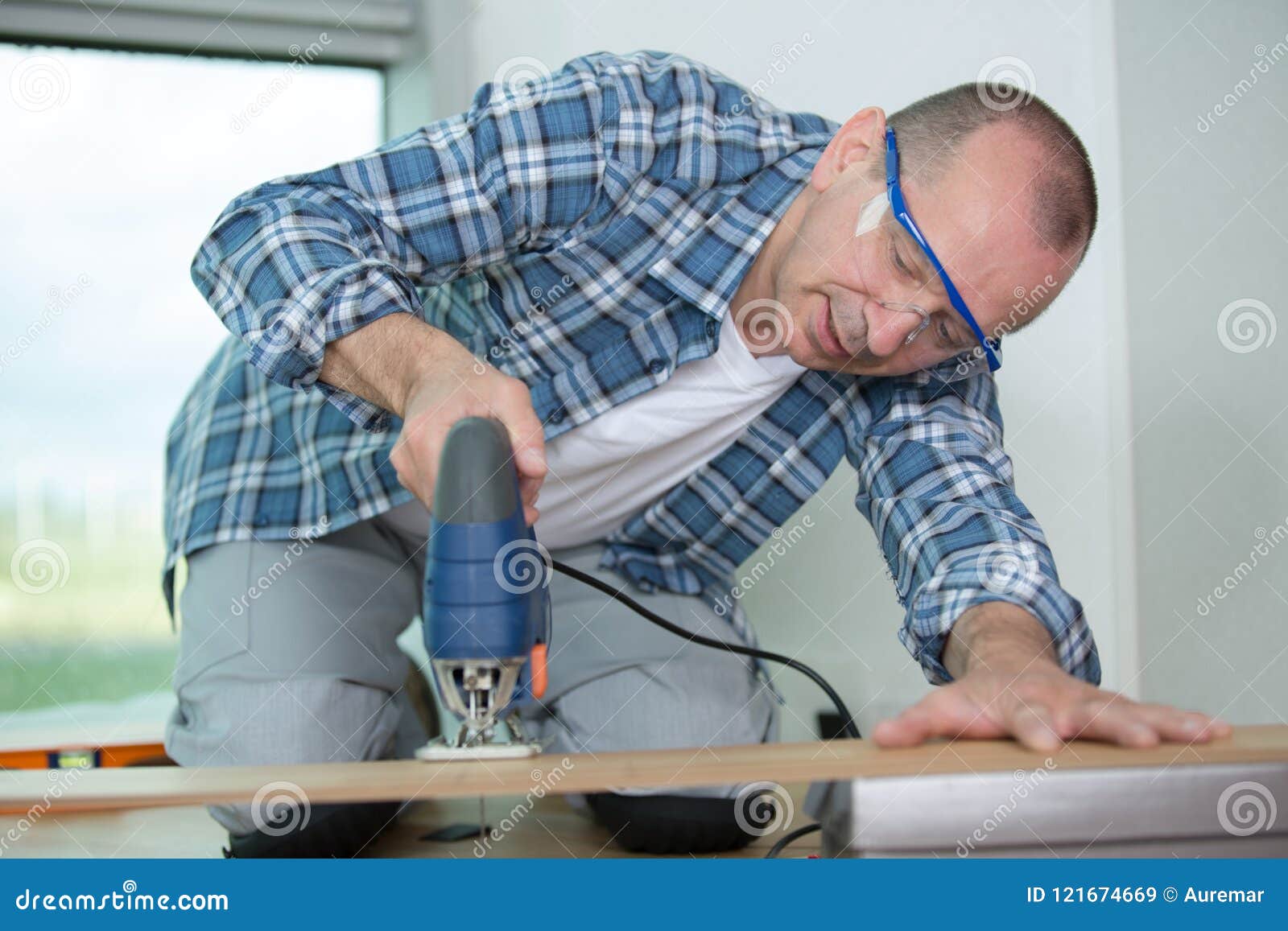 Carpenter Cutting Wood Board Stock Image - Image of background ...