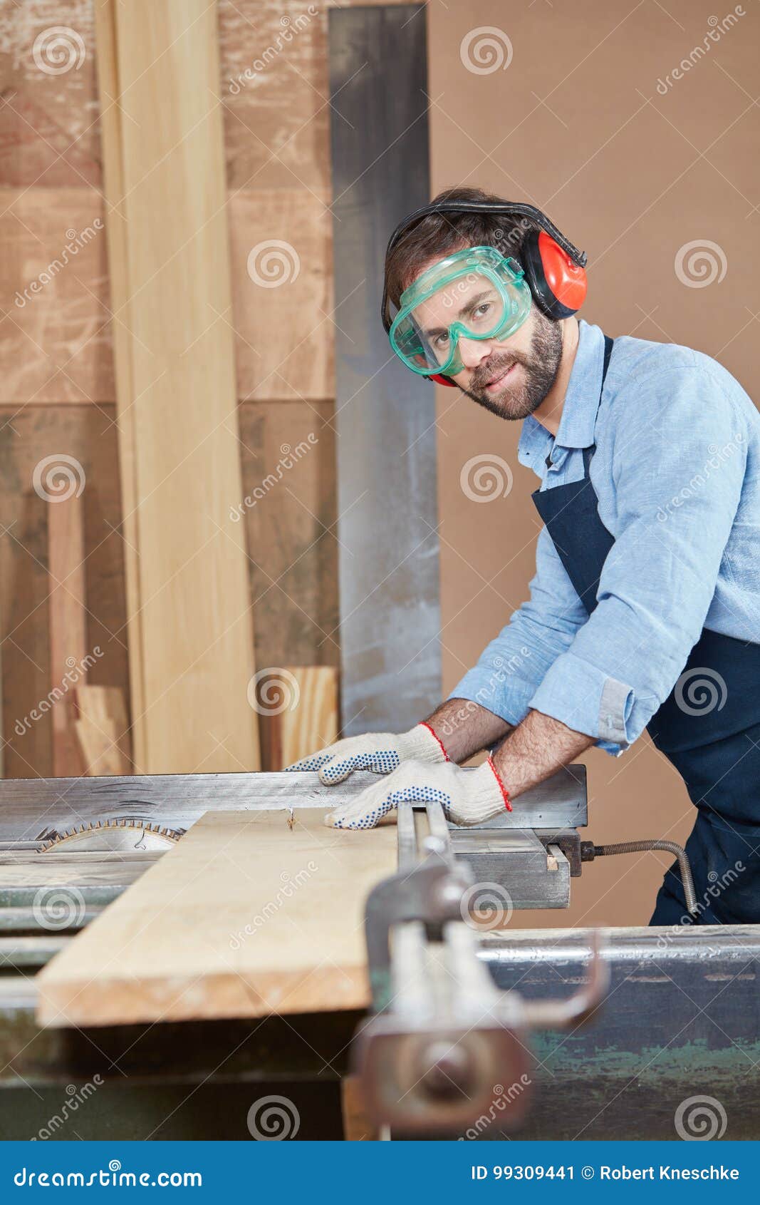 Carpenter cutting wood stock image. Image of work, people - 99309441