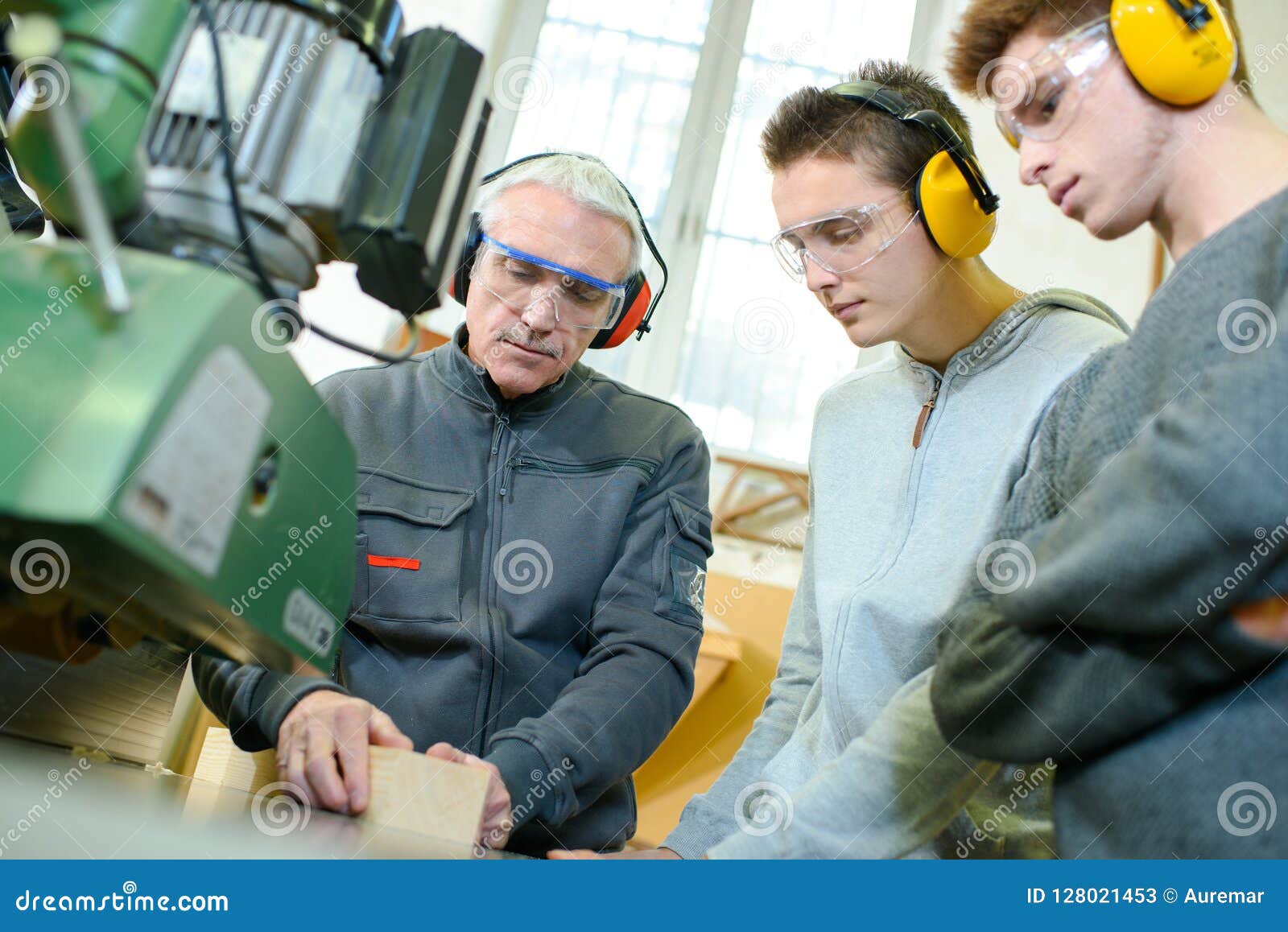 Carpenter Demonstrating Machine To Students Stock Image - Image of ...