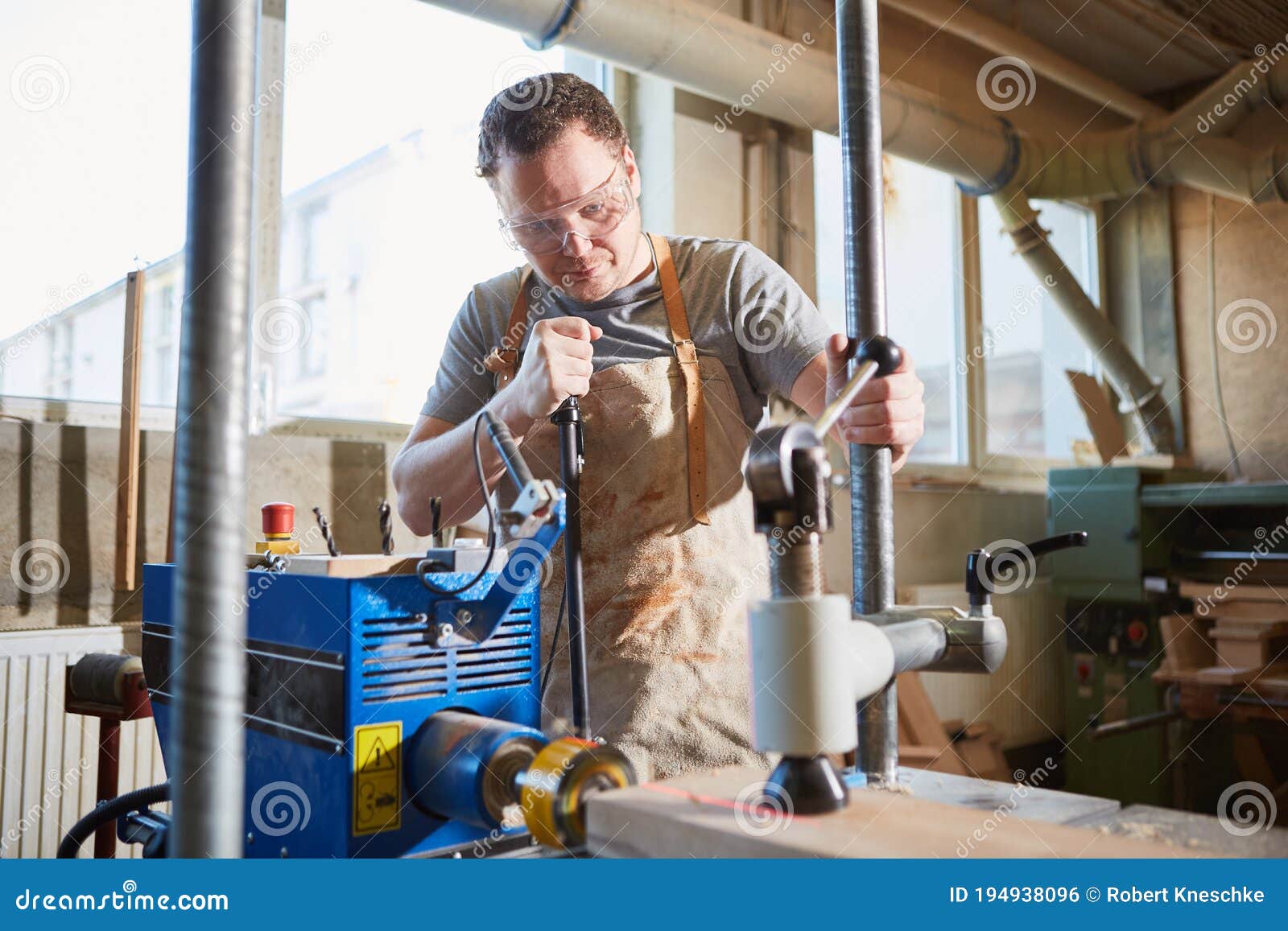Carpenter on Drill with Laser Display Stock Photo - Image of collar ...
