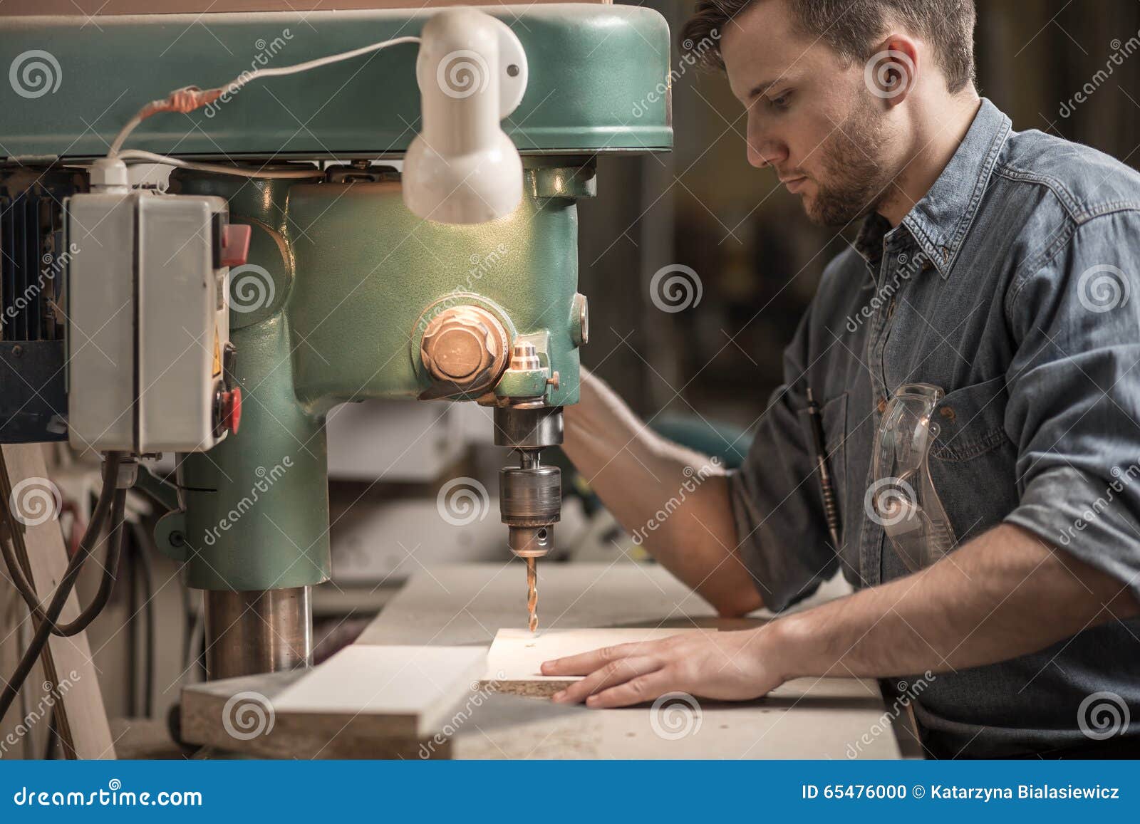 Carpenter Drilling Wood Using Portable Drilling Machine Royalty-Free ...