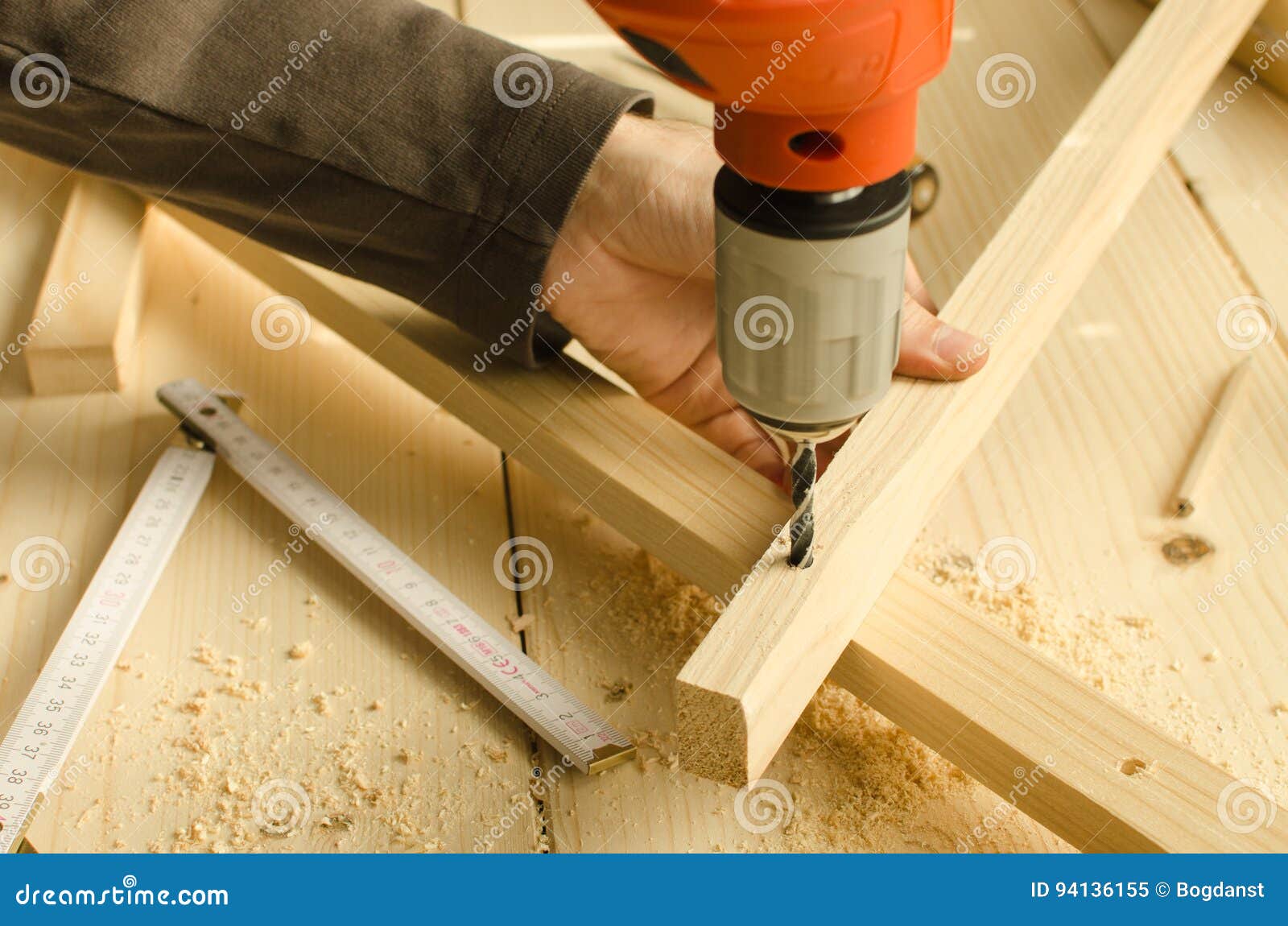 Carpenter drilling wood stock image. Image of drill, crafting - 94136155