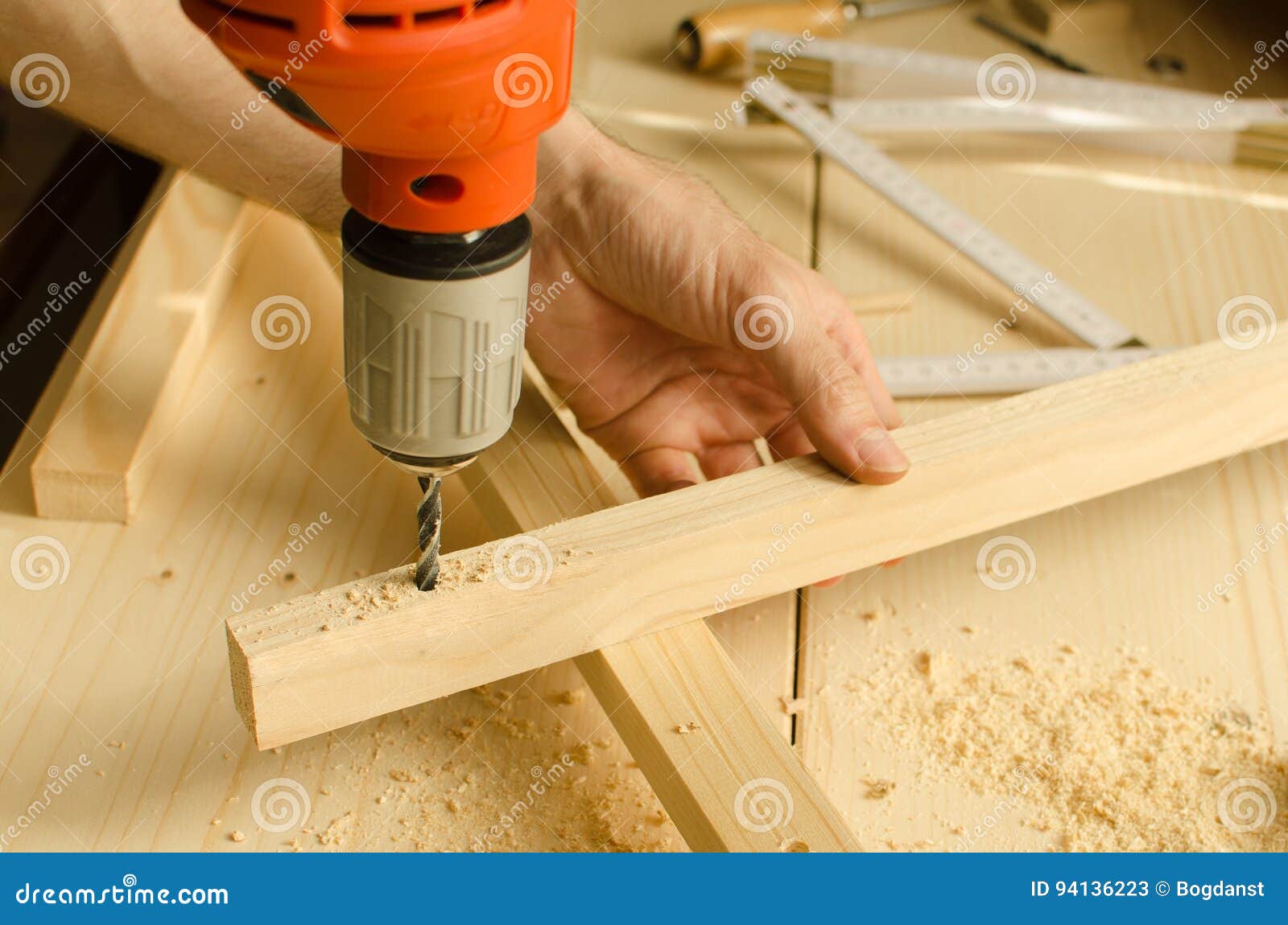Carpenter drilling wood stock image. Image of carpenter - 94136223