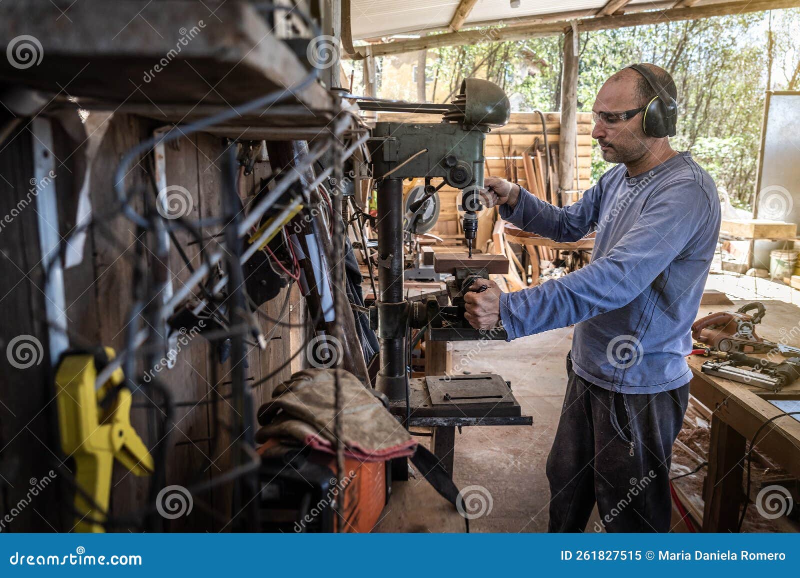 Carpenter Drills a Hole Using a Drilling Machine Stock Image - Image of ...