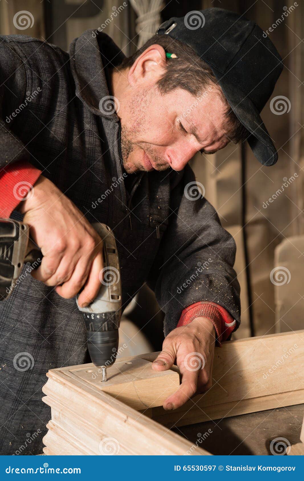 Carpenter Drills Latch Hole Of Door Lock, Using Spade Bit. Royalty-Free ...