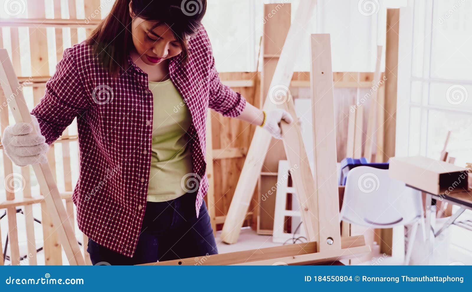 Carpenter Fitting Pieces of Boards Together at Site Stock Photo - Image ...