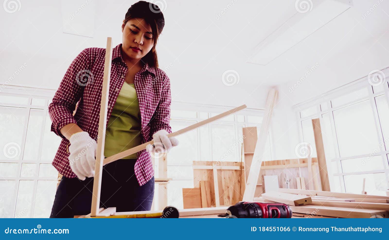 Carpenter Fitting Pieces of Boards Together at Site Stock Photo - Image ...