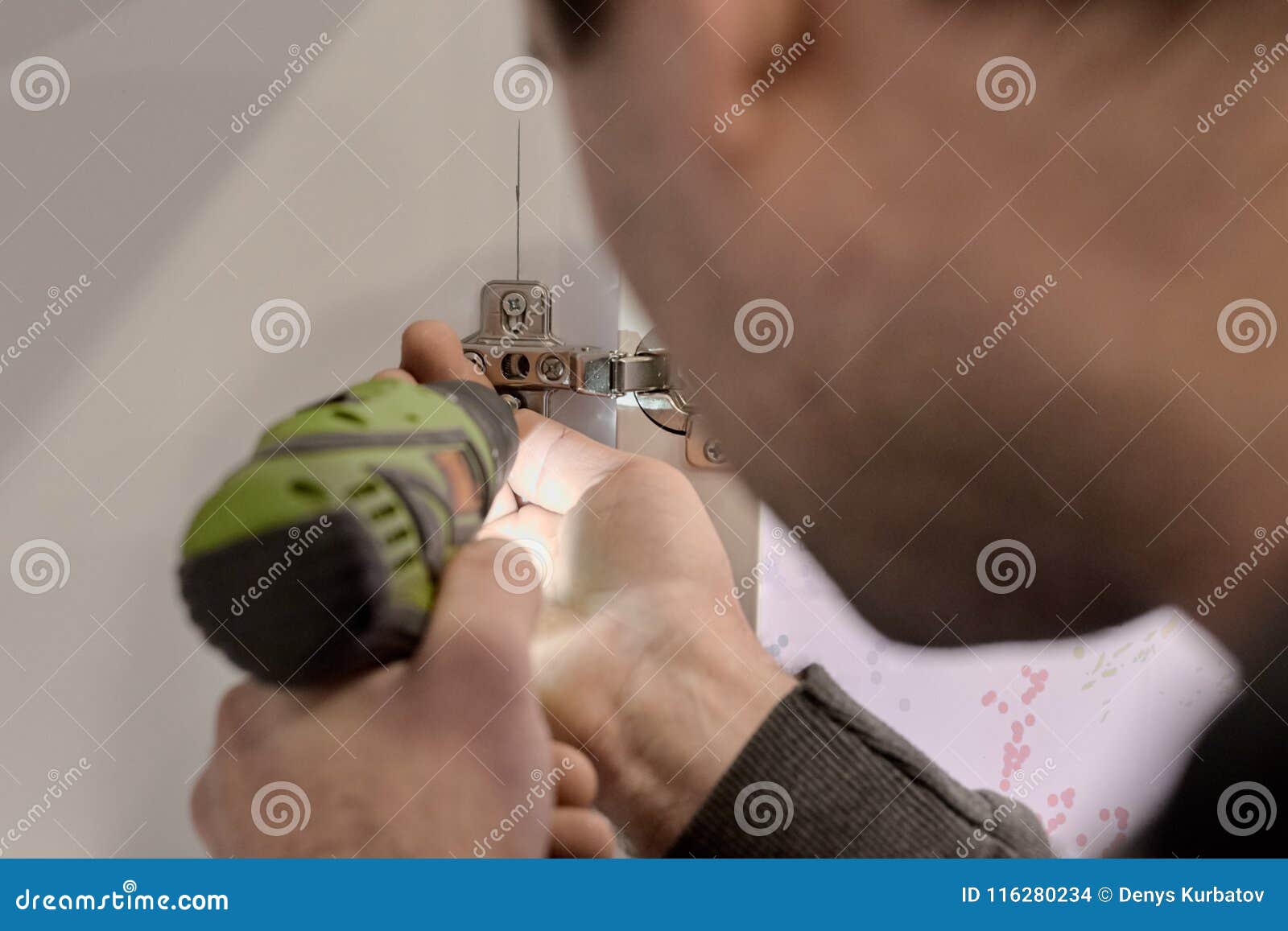 Carpenter fixing henge stock photo. Image of engineer - 116280234
