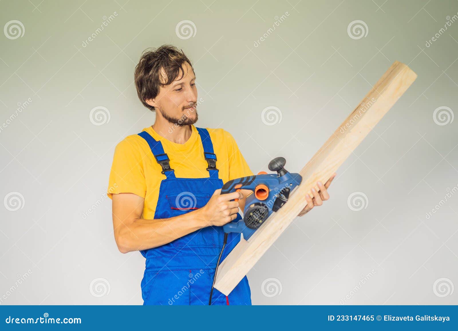 Carpenter with Grinder and Plane. Woodworking, Professional Stock Image ...