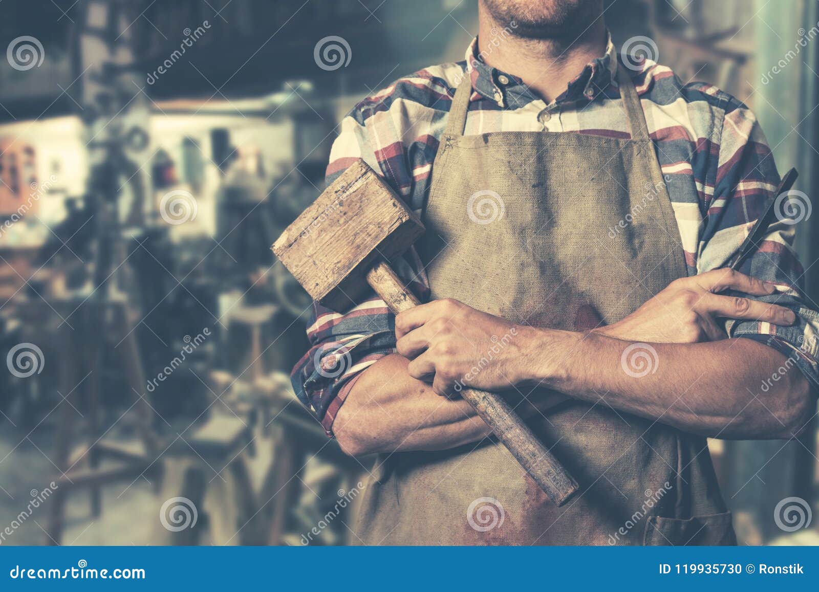 Carpenter with Hammer and Chisel in Hands in Workshop Stock Photo ...