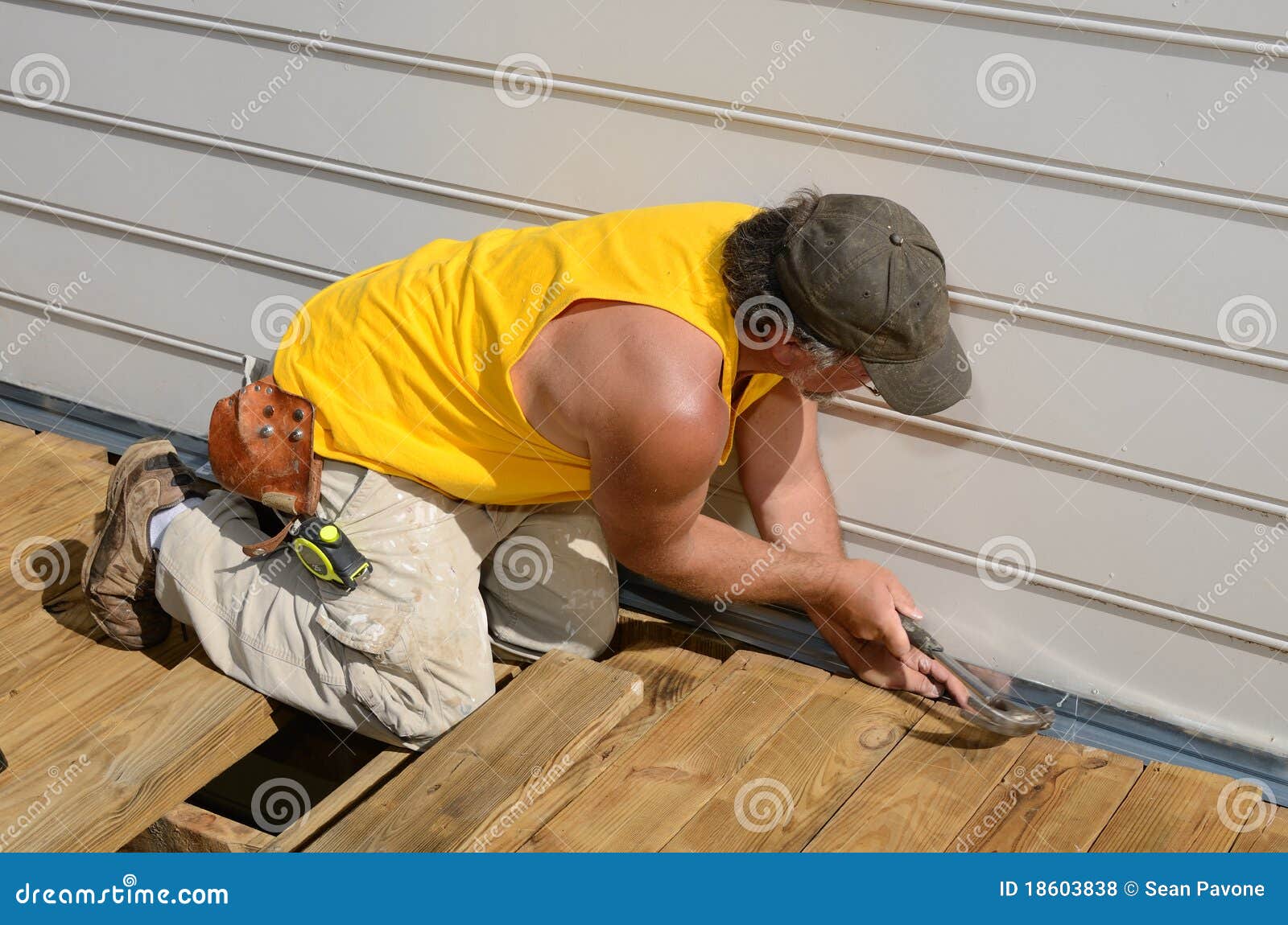 Carpenter Hammering stock photo. Image of pound, construction - 18603838