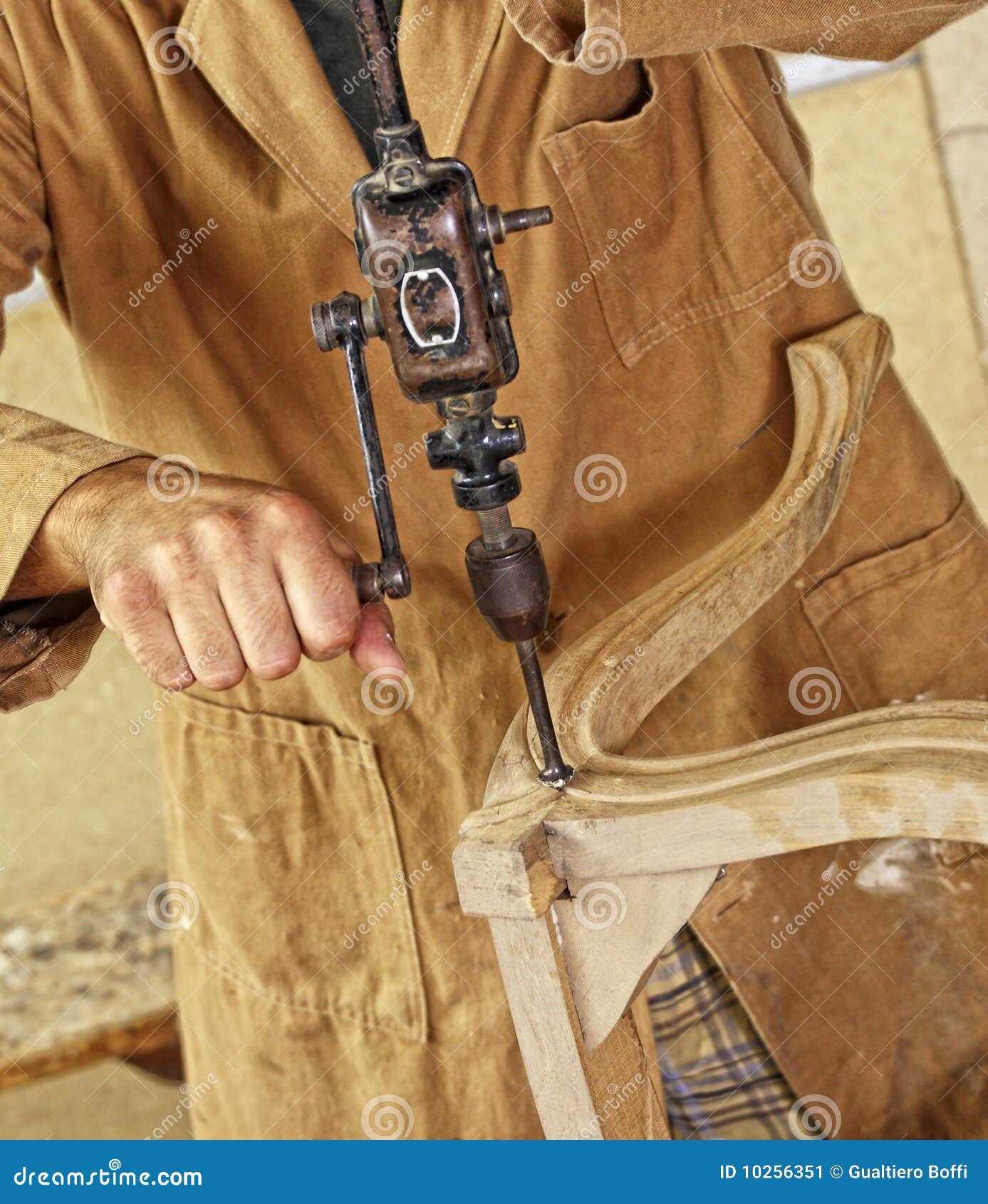 Carpenter with hand drill stock image. Image of dust - 10256351