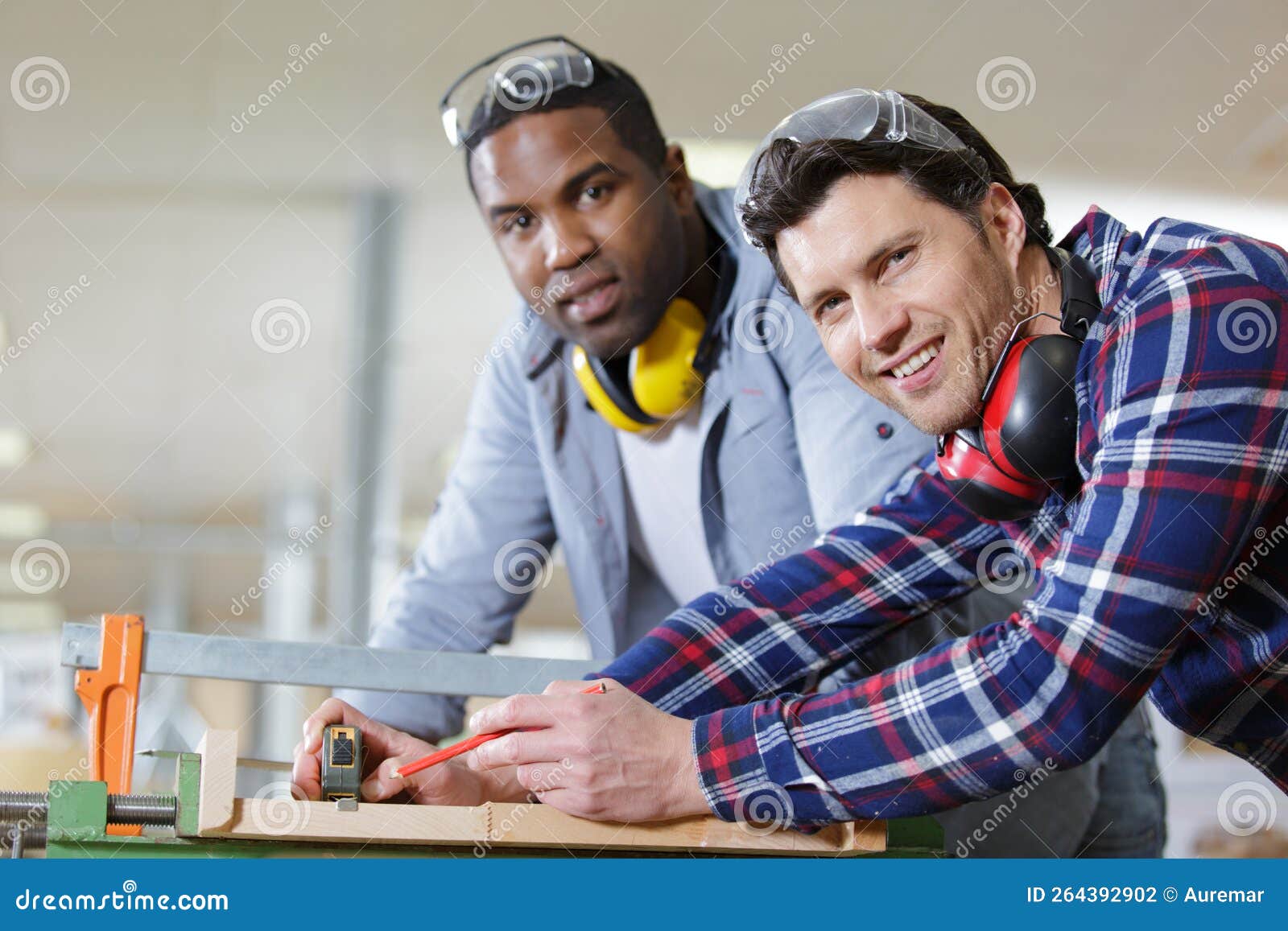 Carpenter and apprentice stock photo. Image of education - 264392902