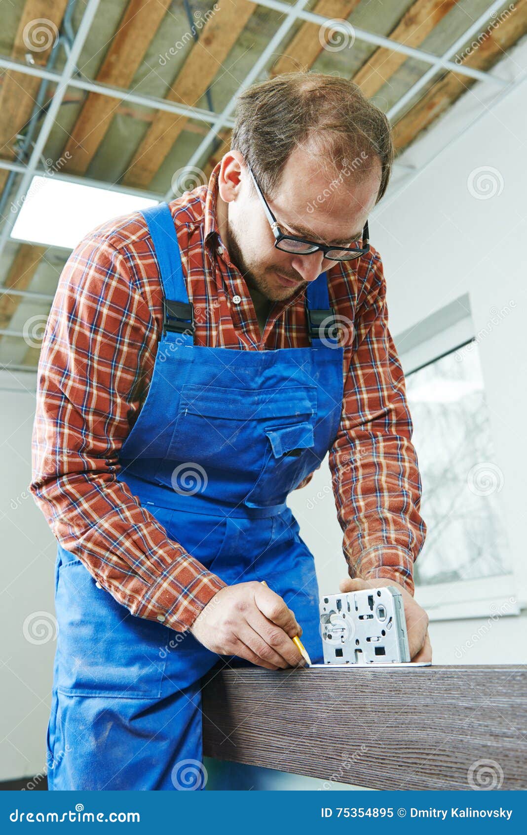 Carpenter Installing Door Lock Stock Image - Image of carpentry ...