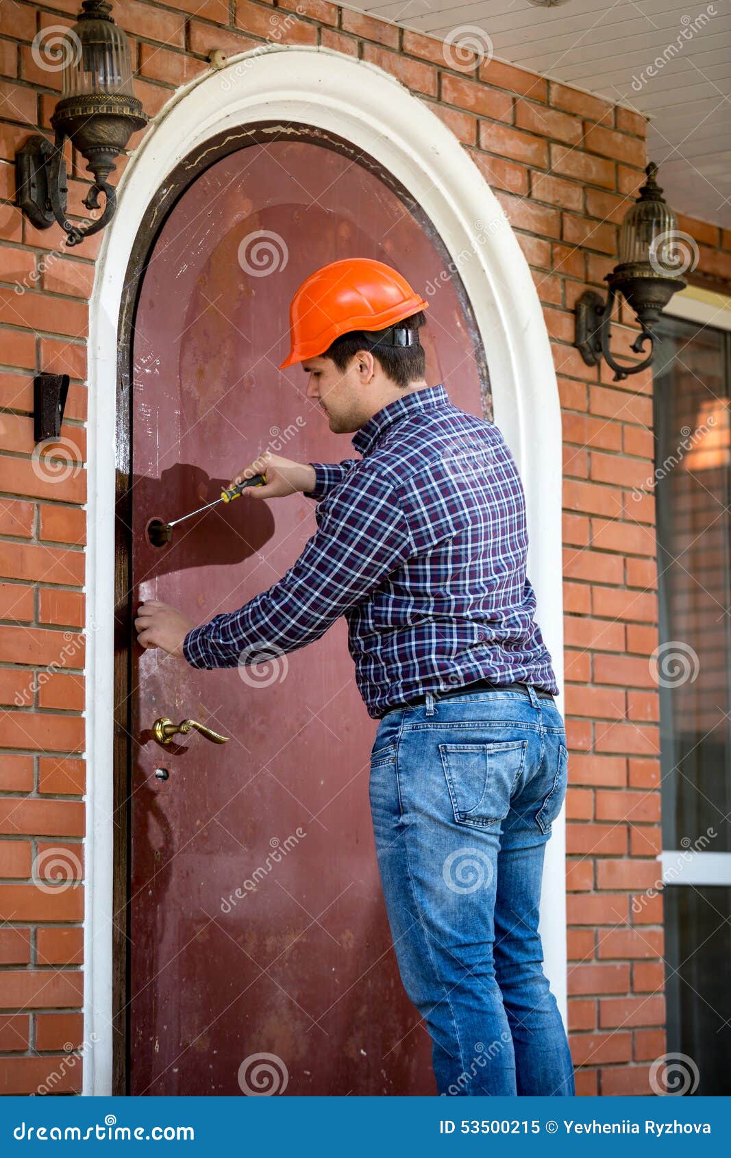 Carpenter Installing Lock at Big Metal Door Stock Image - Image of home ...