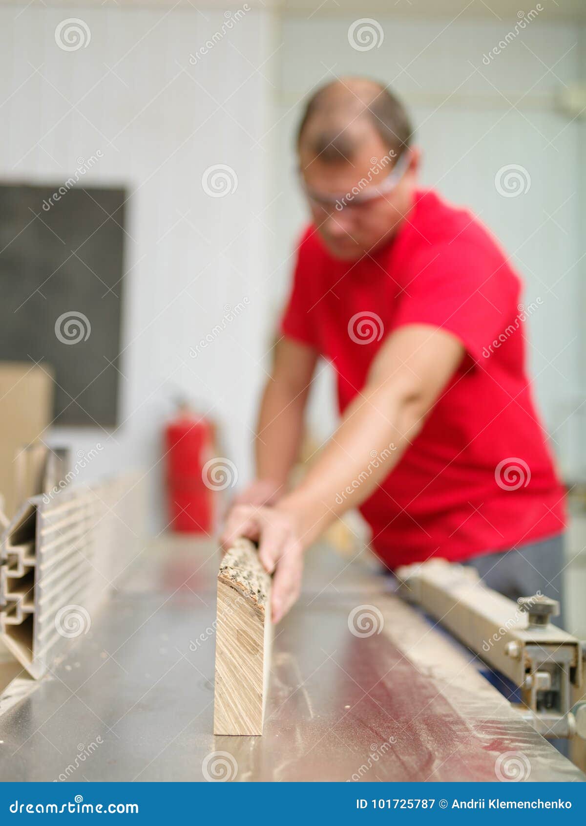 The Carpenter is Leveling the Timber Bar in the Workplace Stock Image ...