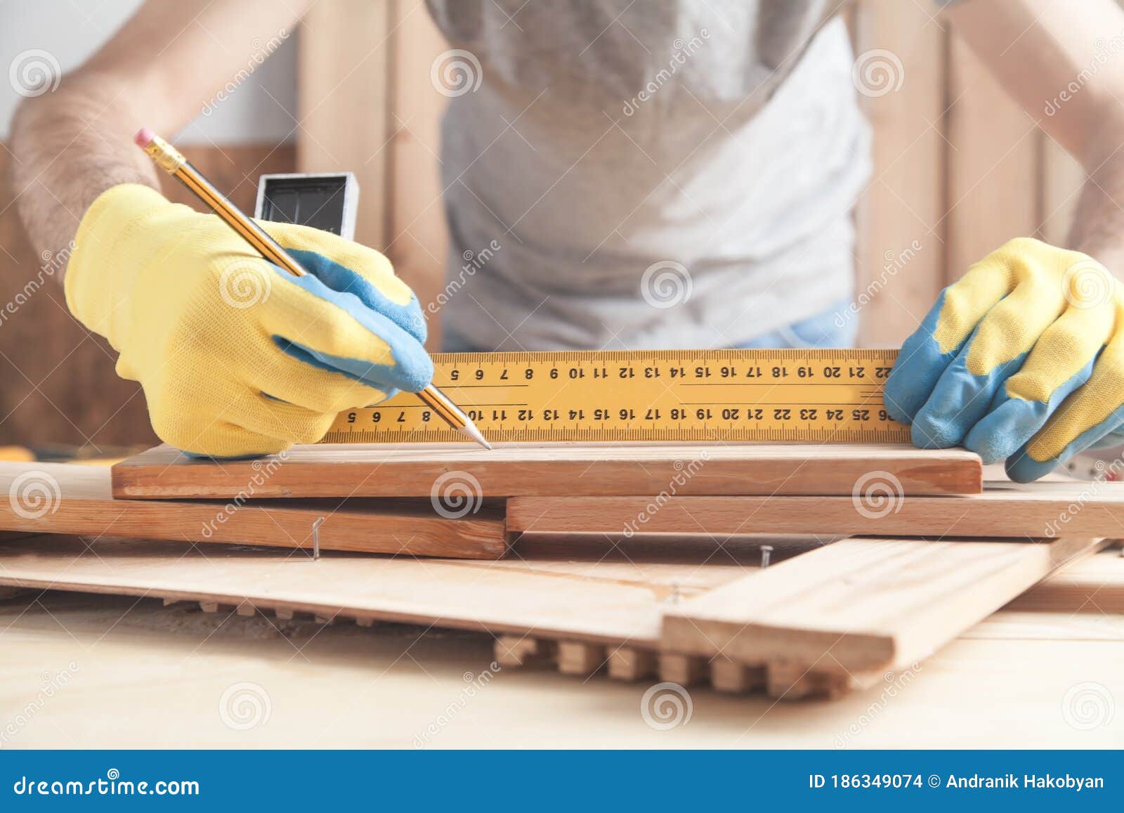 Carpenter Making Marks on Wooden Plank with a Pencil Stock Photo ...