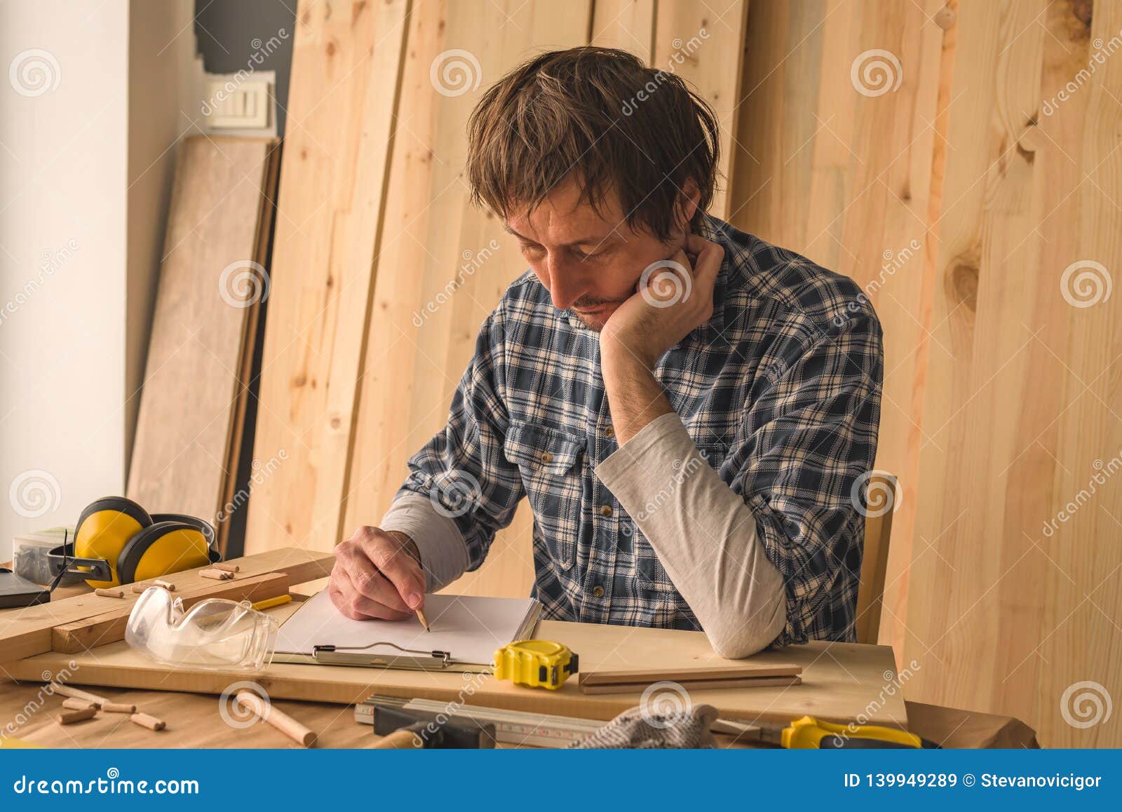 Carpenter Making Woodwork Project Notes on Clipboard Paper Stock Image ...