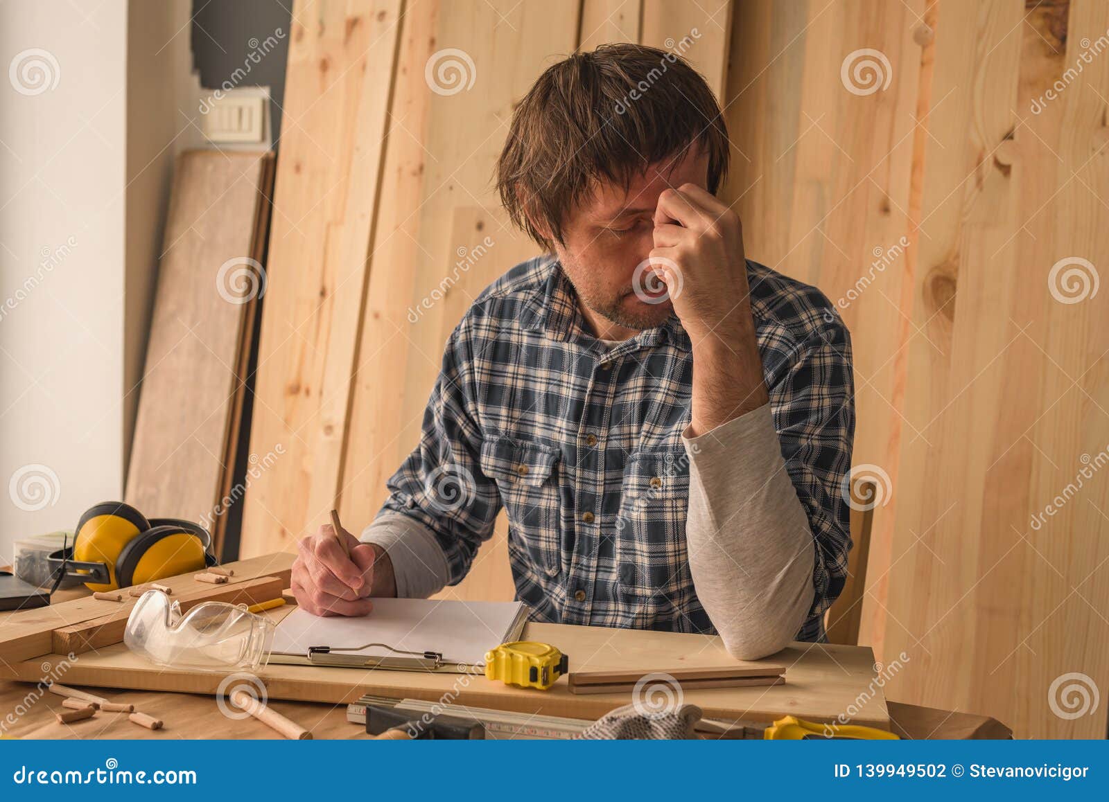 Carpenter Making Woodwork Project Notes on Clipboard Paper Stock Photo ...