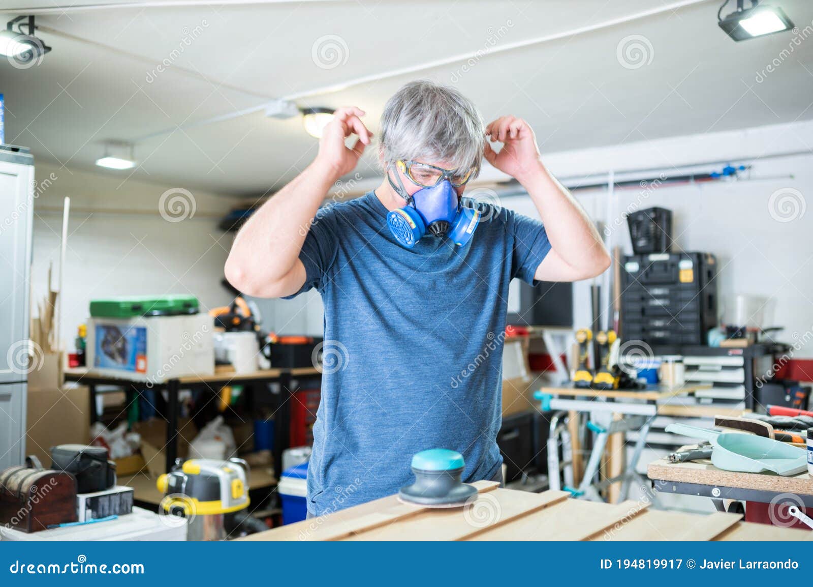 Carpenter Man Wears a Mask To Protect Himself from Dust in His Workshop ...
