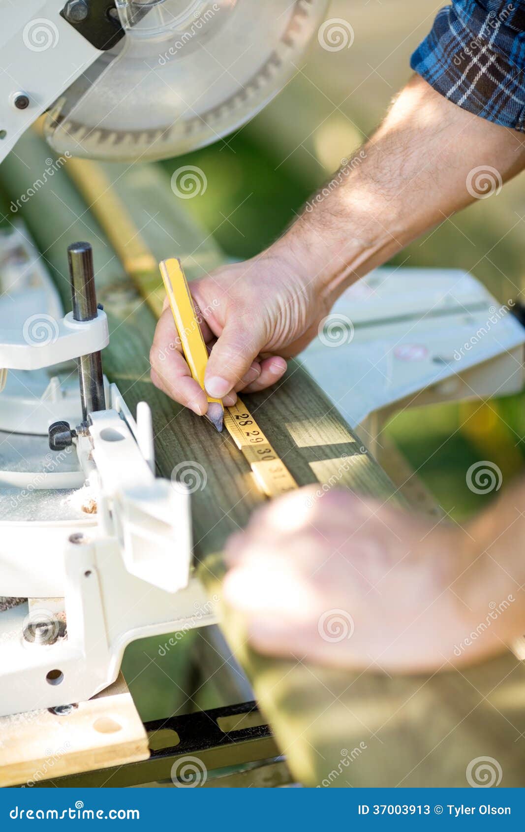 Carpenter Marking on Wood Using Ruler at Table Saw Stock Image - Image ...