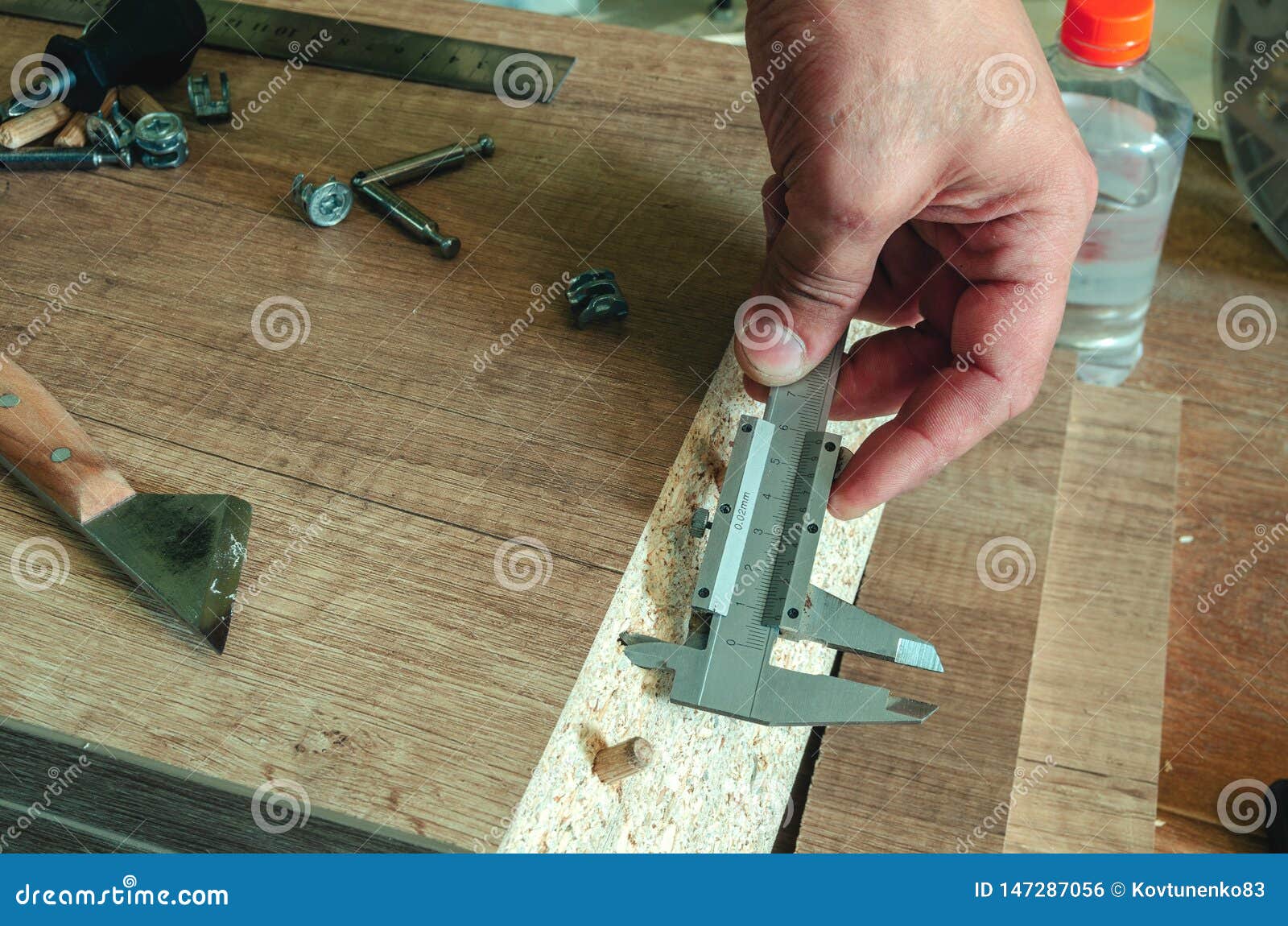 Carpenter Measures the Holes Made with a Caliper Stock Photo - Image of ...