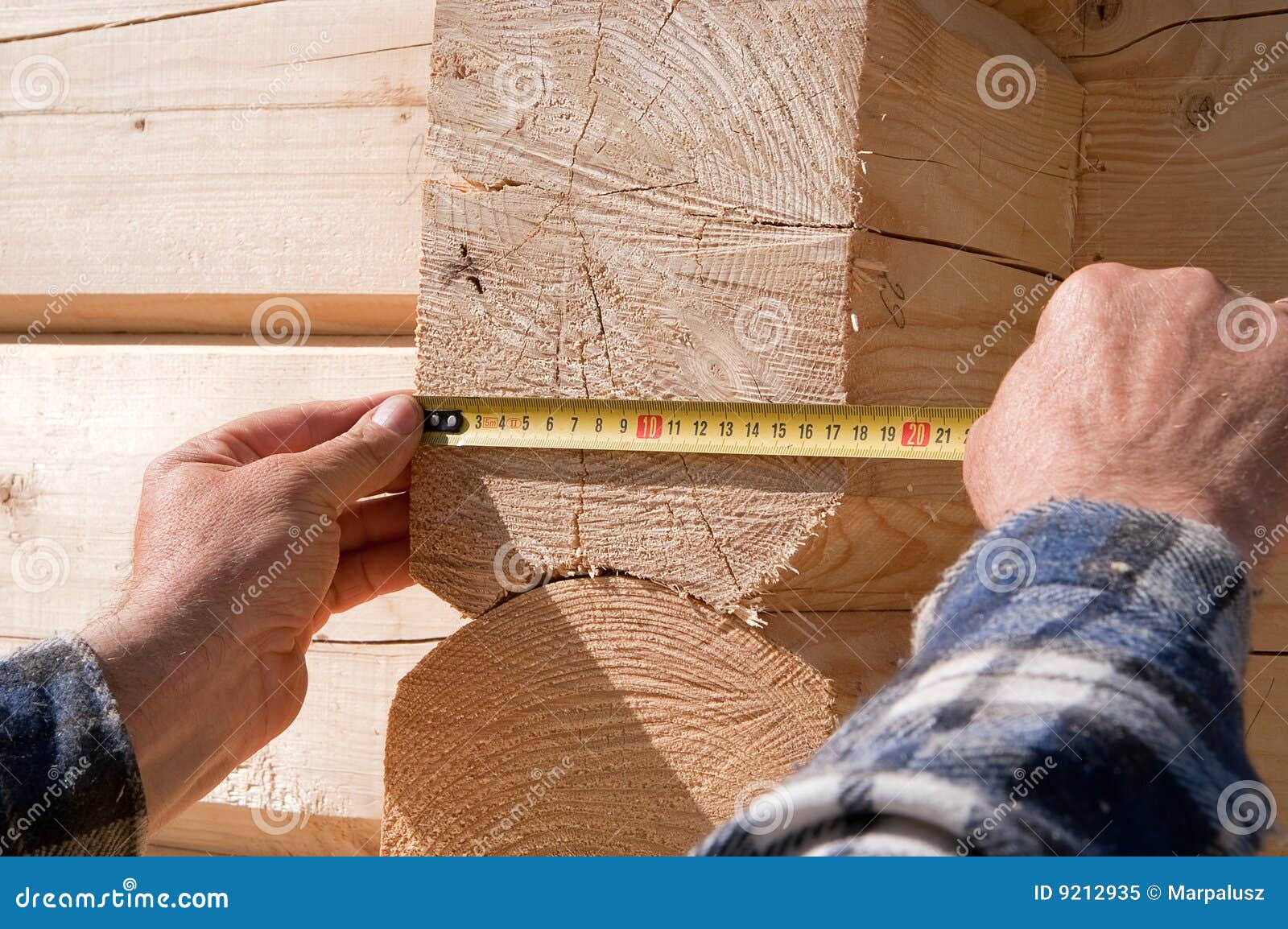 Carpenter Measures Wooden Logs Stock Image - Image of carpentry ...