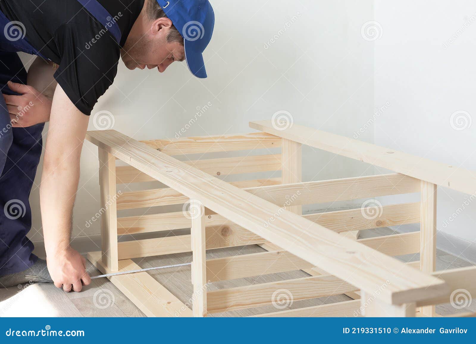 Carpenter Measures The Width Between The Legs Royalty-Free Stock Photo ...