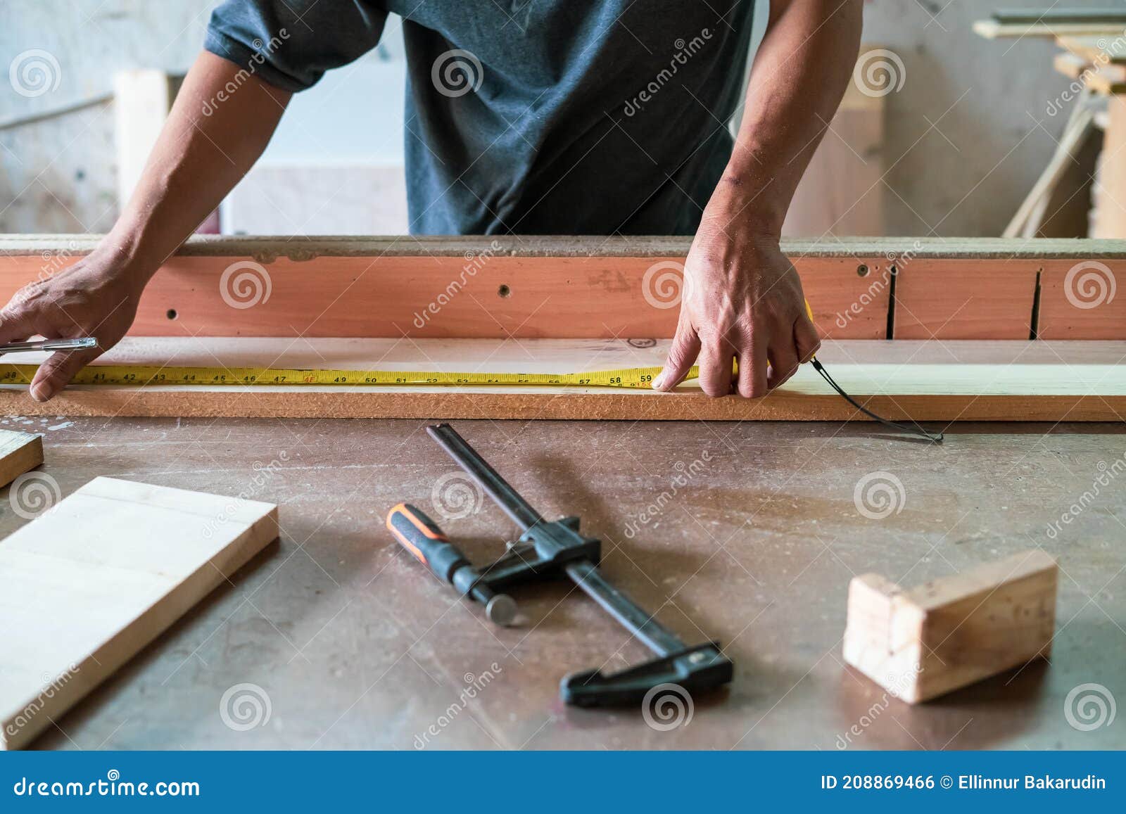 Carpenter Measuring the Wood at the Workshop Stock Photo - Image of ...
