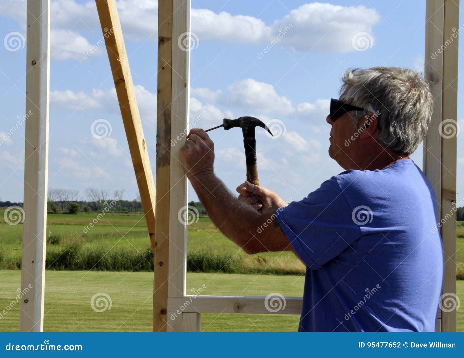 Carpenter Nailing with a Hammer Stock Photo - Image of wall, nailing ...
