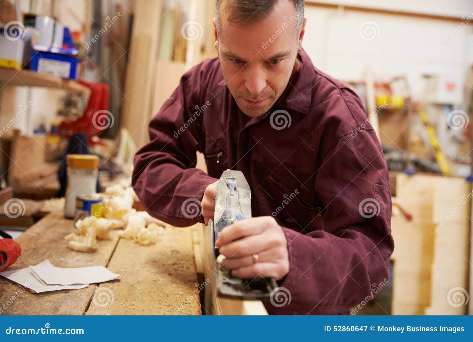 Carpenter Planing Wood in Workshop Stock Image - Image of person ...