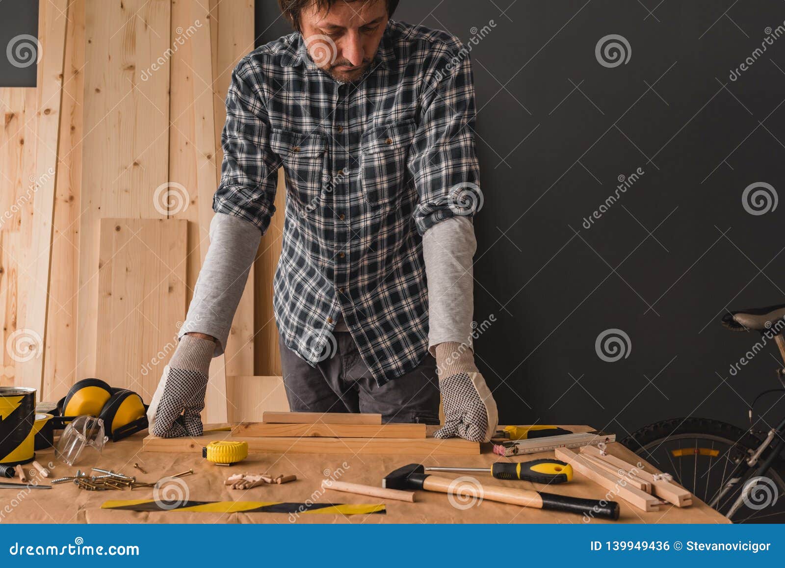 Carpenter is Planning Woodwork Project in Workshop Stock Photo - Image ...