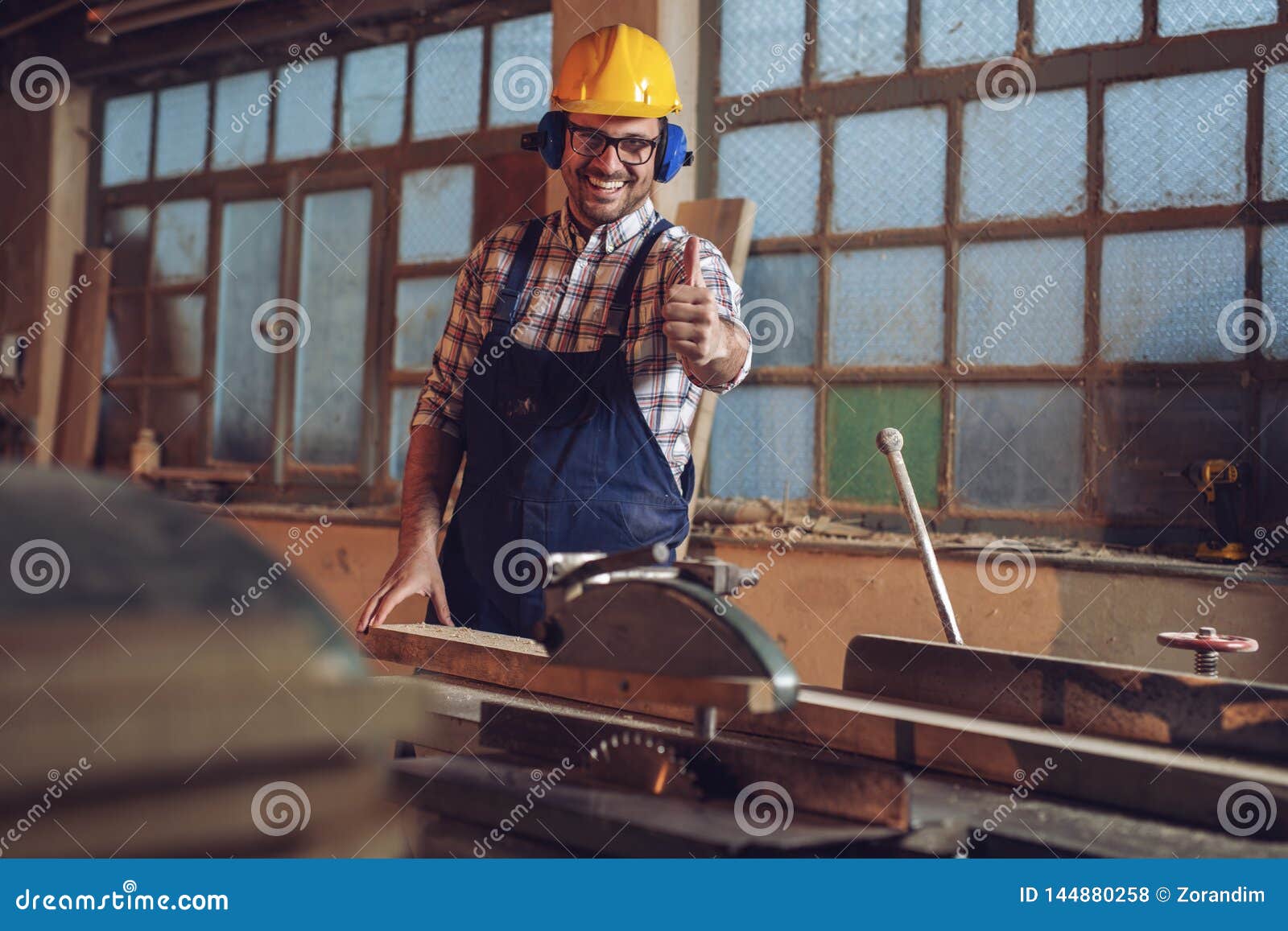 Carpenter Posing on His Workplace in Carpentry Workshop - Happy ...