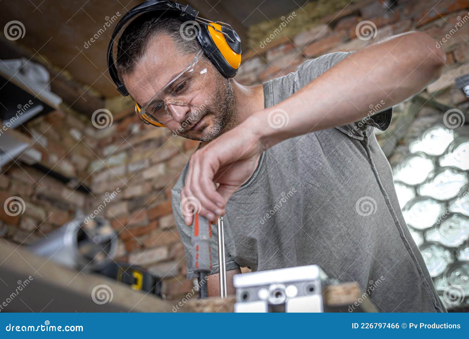 A Carpenter Works with Professional Woodworking Tools Stock Photo ...