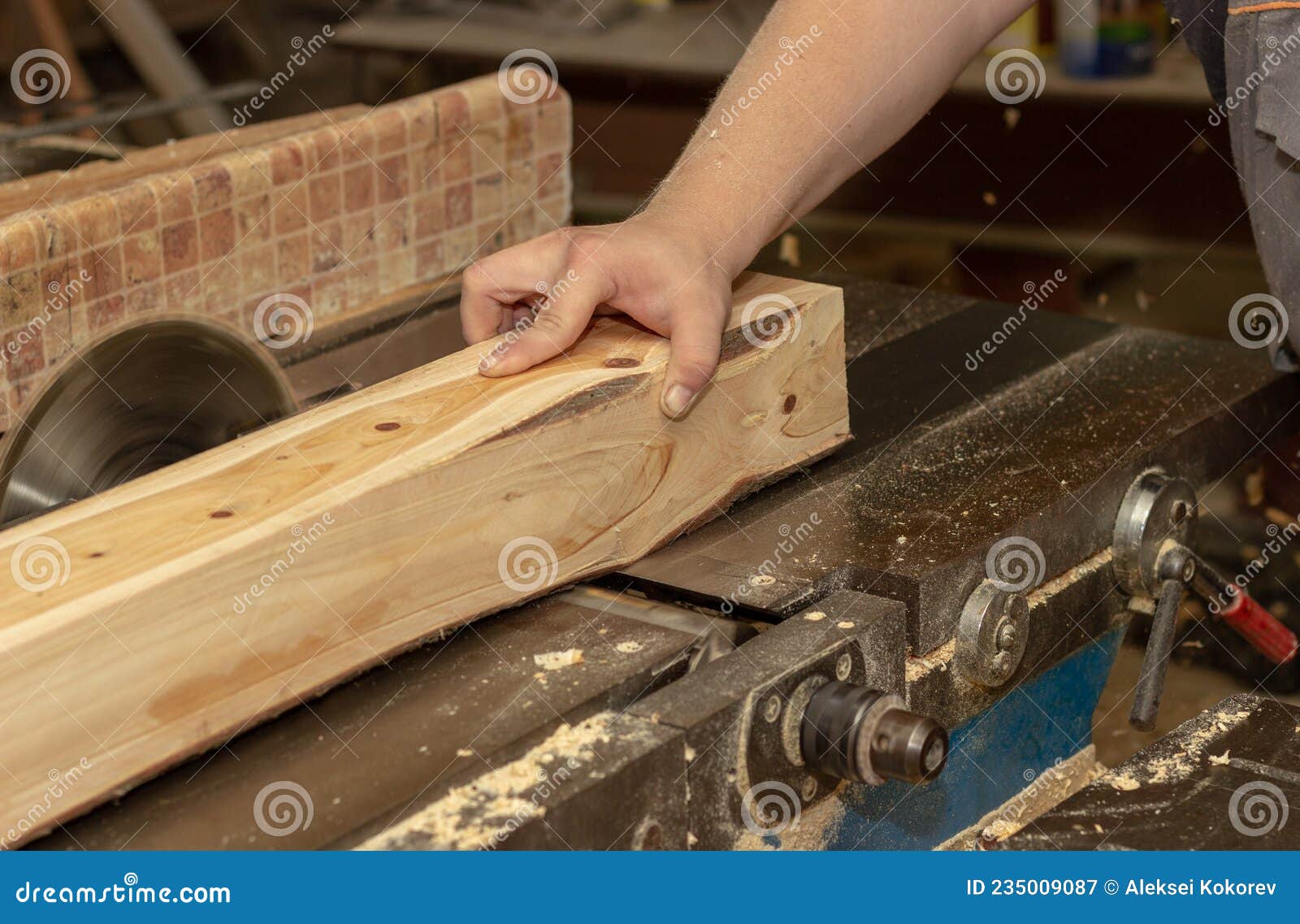 A Carpenter Processes Wood on a Machine Stock Image - Image of iron ...