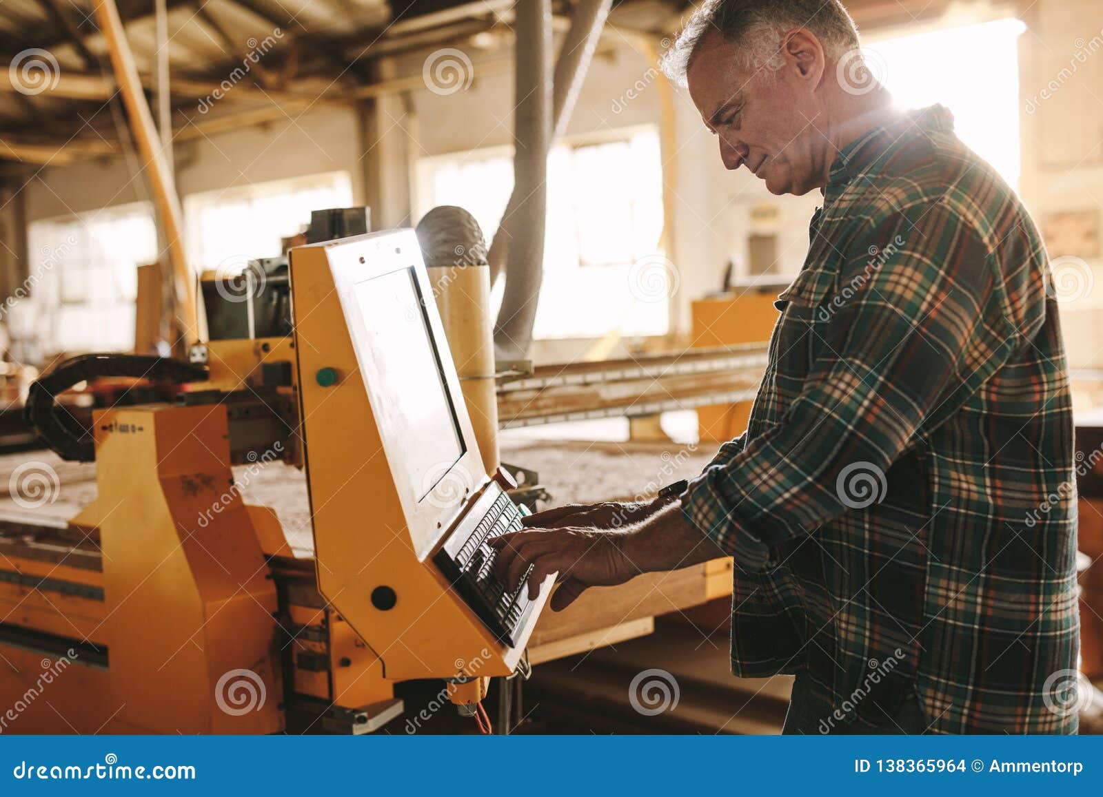 Carpenter Programming a Cnc Wood Working Machine Stock Photo - Image of ...