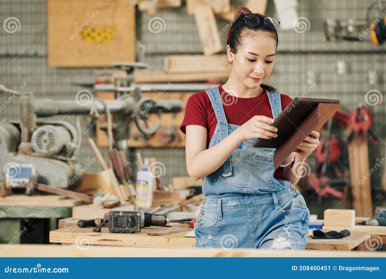 Carpenter Reading Article Online Stock Image - Image of client ...