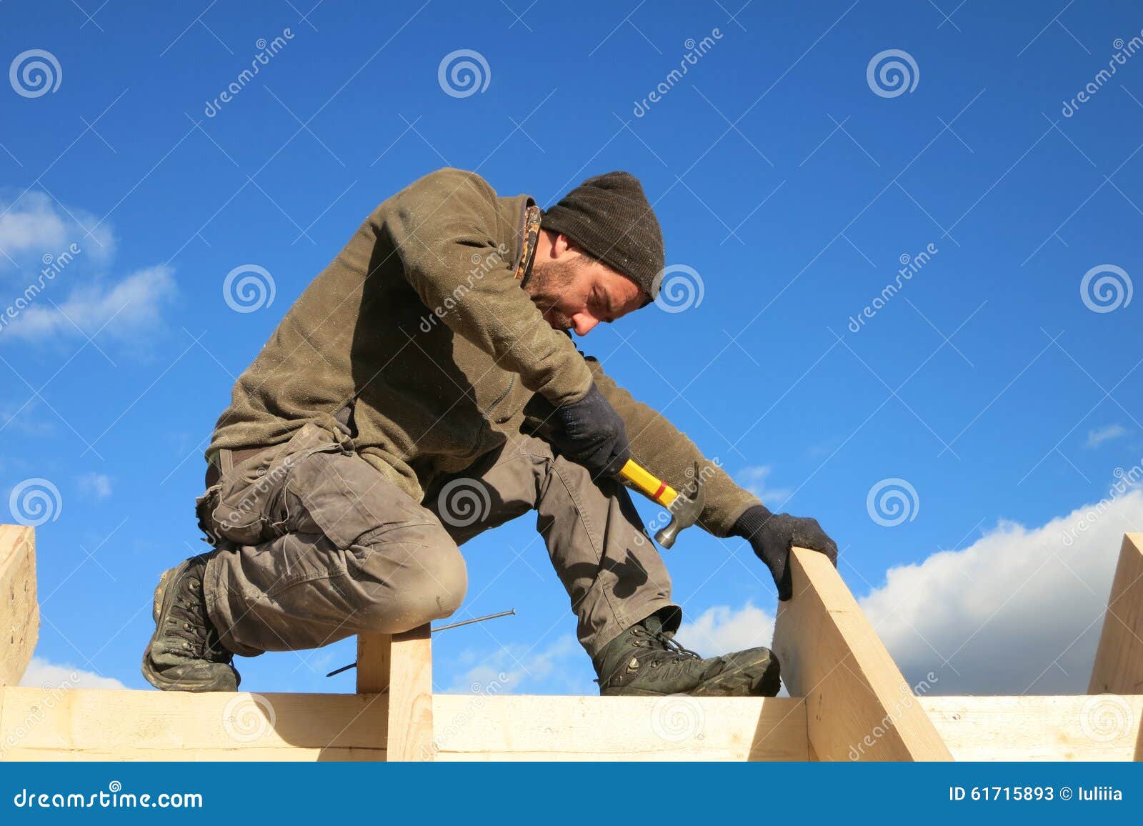 Carpenter on roof stock image. Image of construction - 61715893