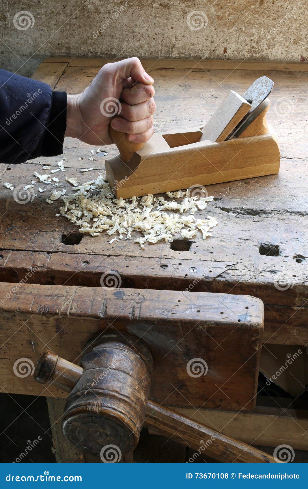 Carpenter S Hand in the Carpentry Workshop with a Plane Stock Photo ...