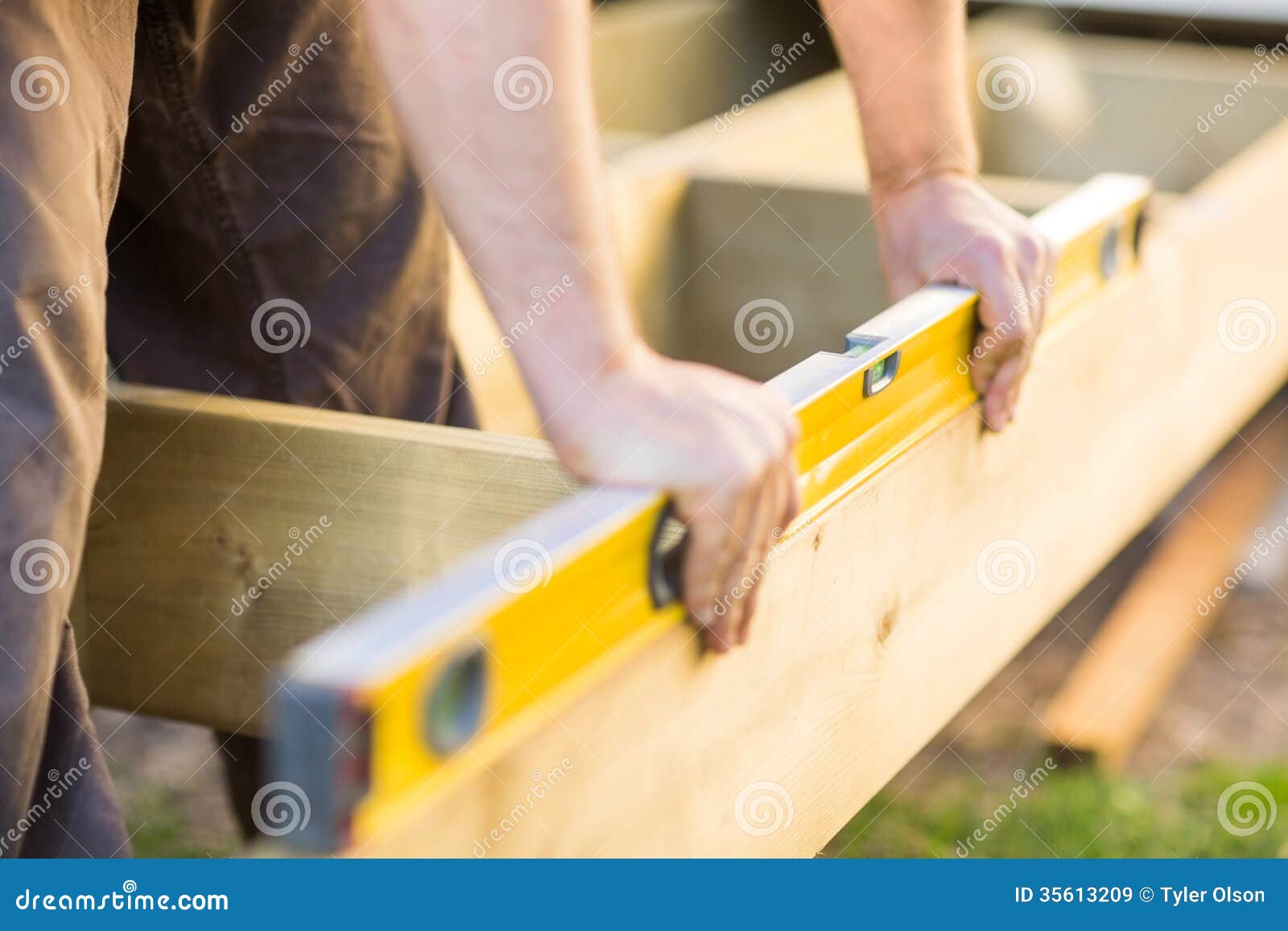 Carpenter S Hands Checking Level of Wood at Site Stock Image - Image of ...