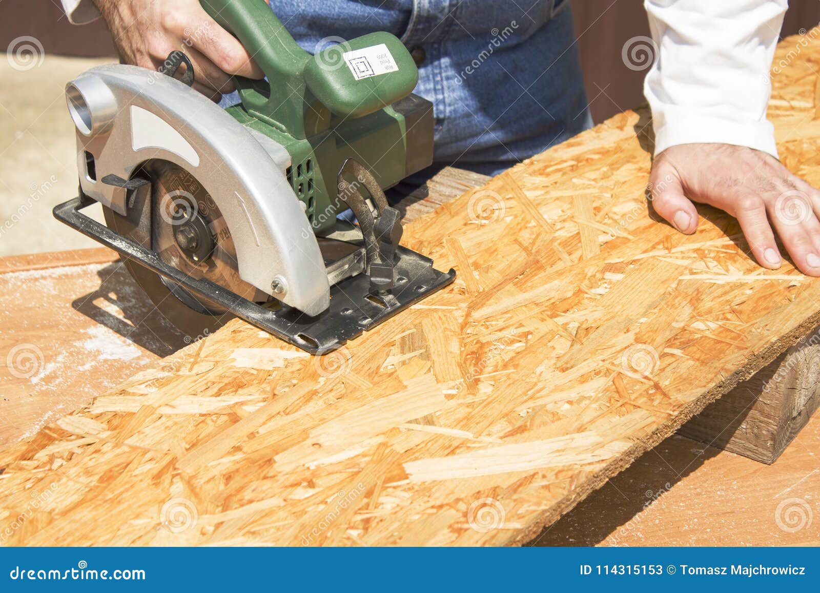 Carpenter`s Workshop. Carpenter Cuts the OSB Stock Image - Image of ...