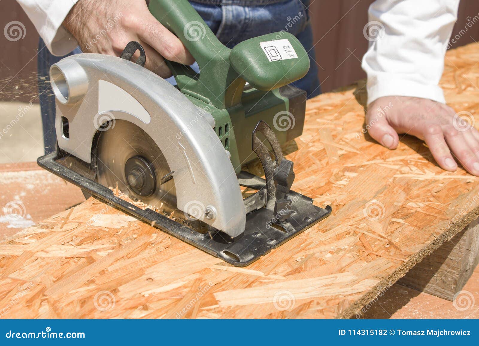 Carpenter`s Workshop. Carpenter Cuts the OSB Stock Photo - Image of ...