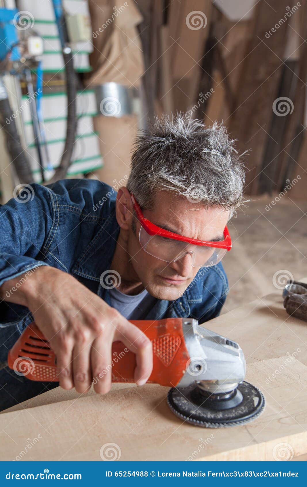 Carpenter with a sander stock photo. Image of people - 65254988