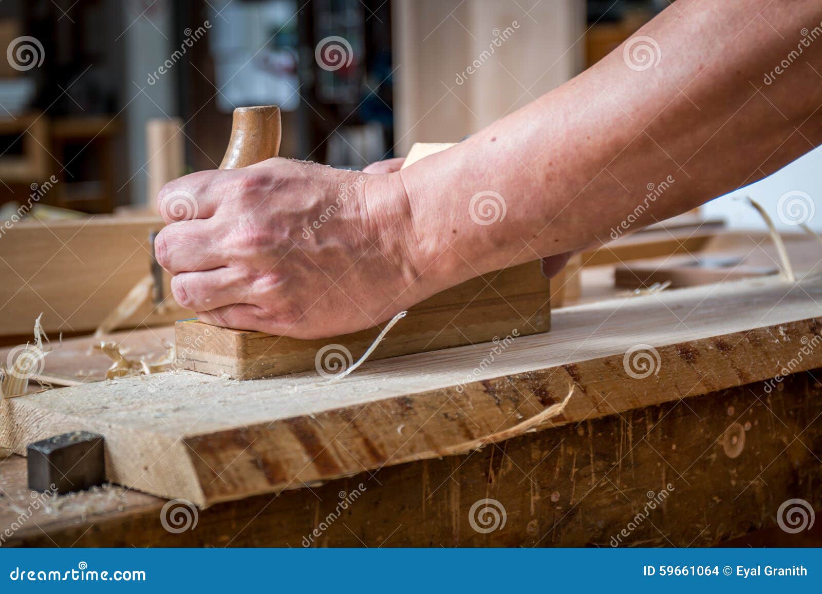Carpenter Sanding Wood in the Carpentry Stock Photo - Image of brown ...