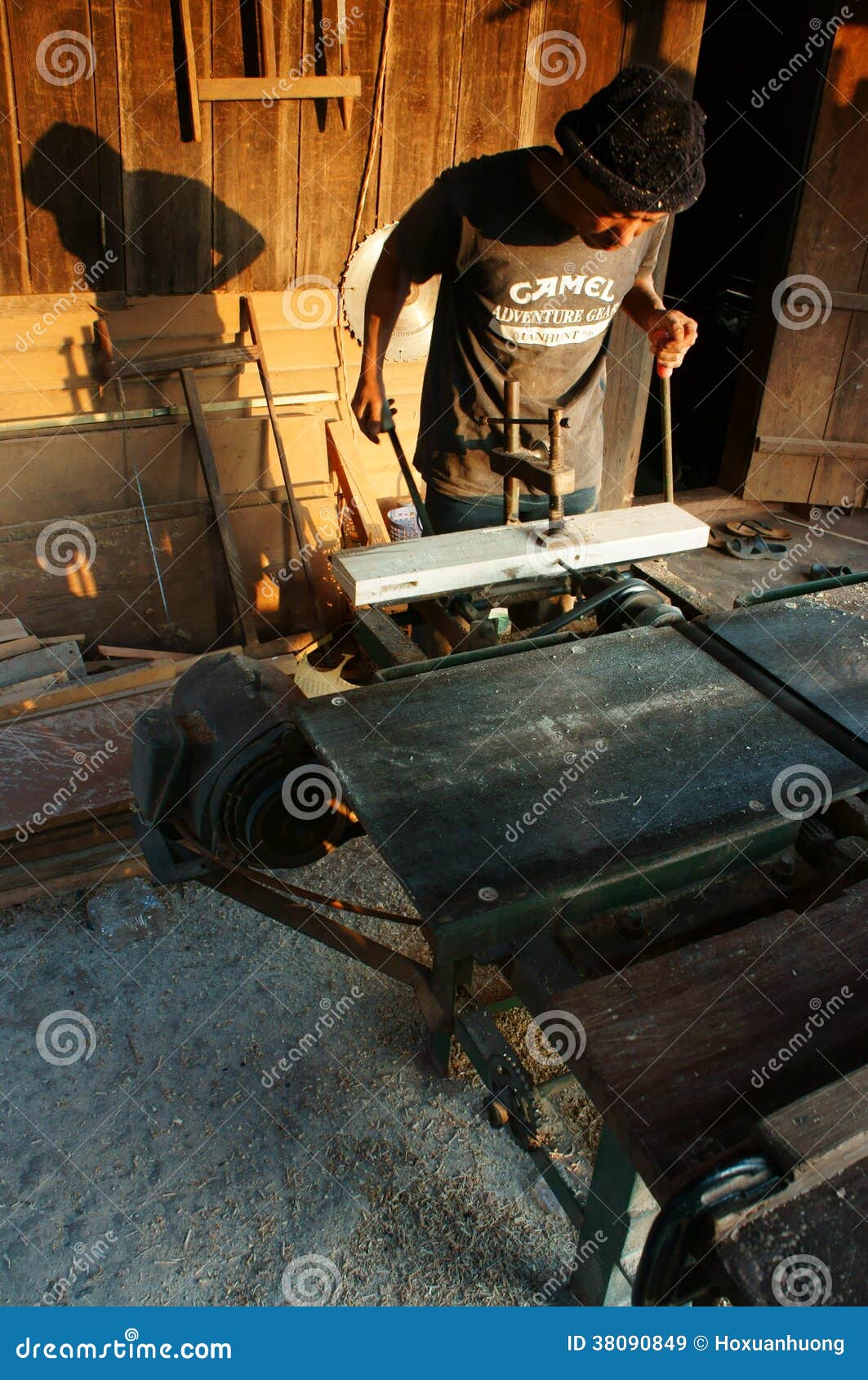 Carpenter Saw Wood by Power Saw at Home Editorial Stock Image - Image ...