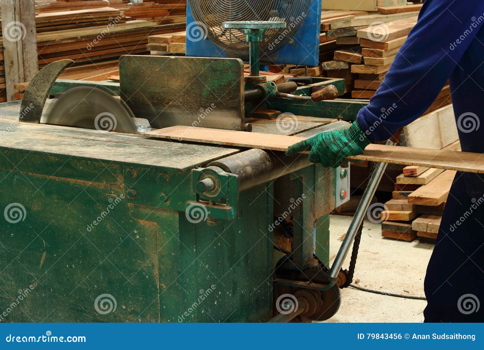 Carpenter Sawing a Piece of Wood on a Table Saw Stock Photo - Image of ...